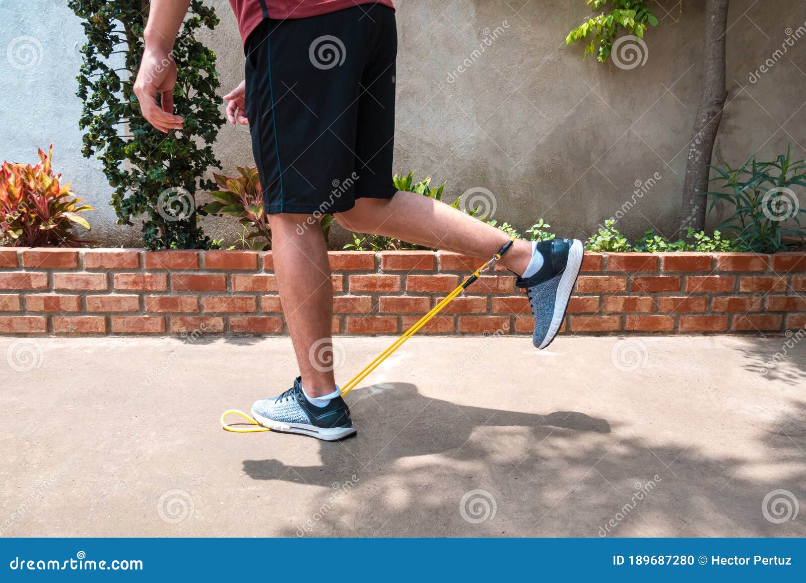 Man Doing Calf Exercise Using Resistance Bands Stock Photo - Image of ...