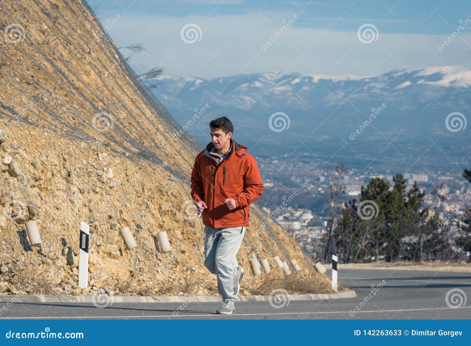 Man Doing Cardio Running on a Mountain Stock Image - Image of jacket ...