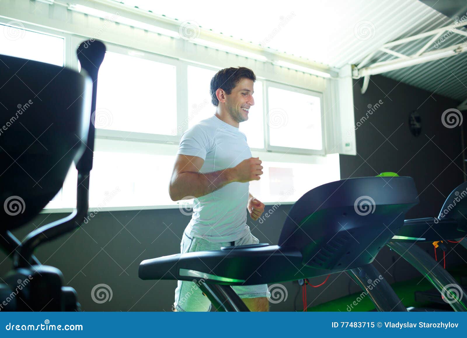 Man Doing Cardio Training Program in Fitness Center Stock Image - Image ...