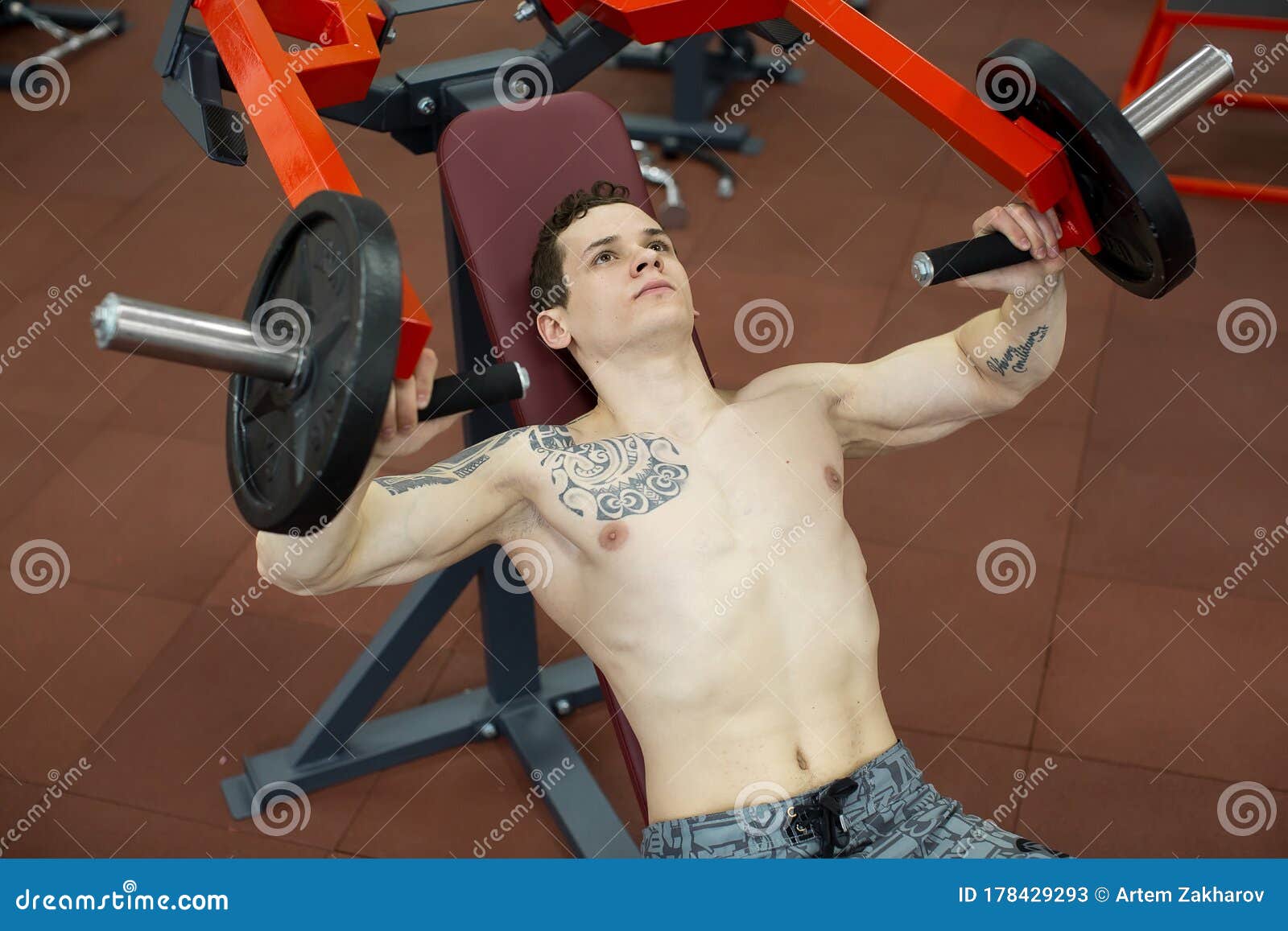 Man Doing Chest Exercises on Vertical Bench Press Machine. Stock Image ...
