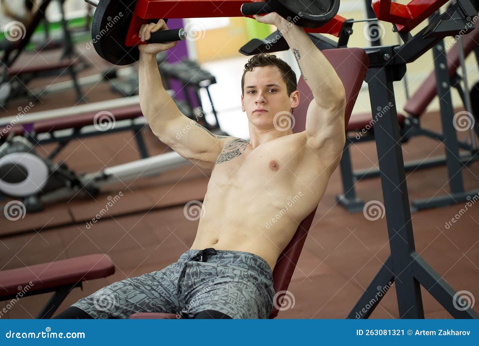 Man Doing Chest Exercises on Vertical Bench Press Machine. Stock Image ...