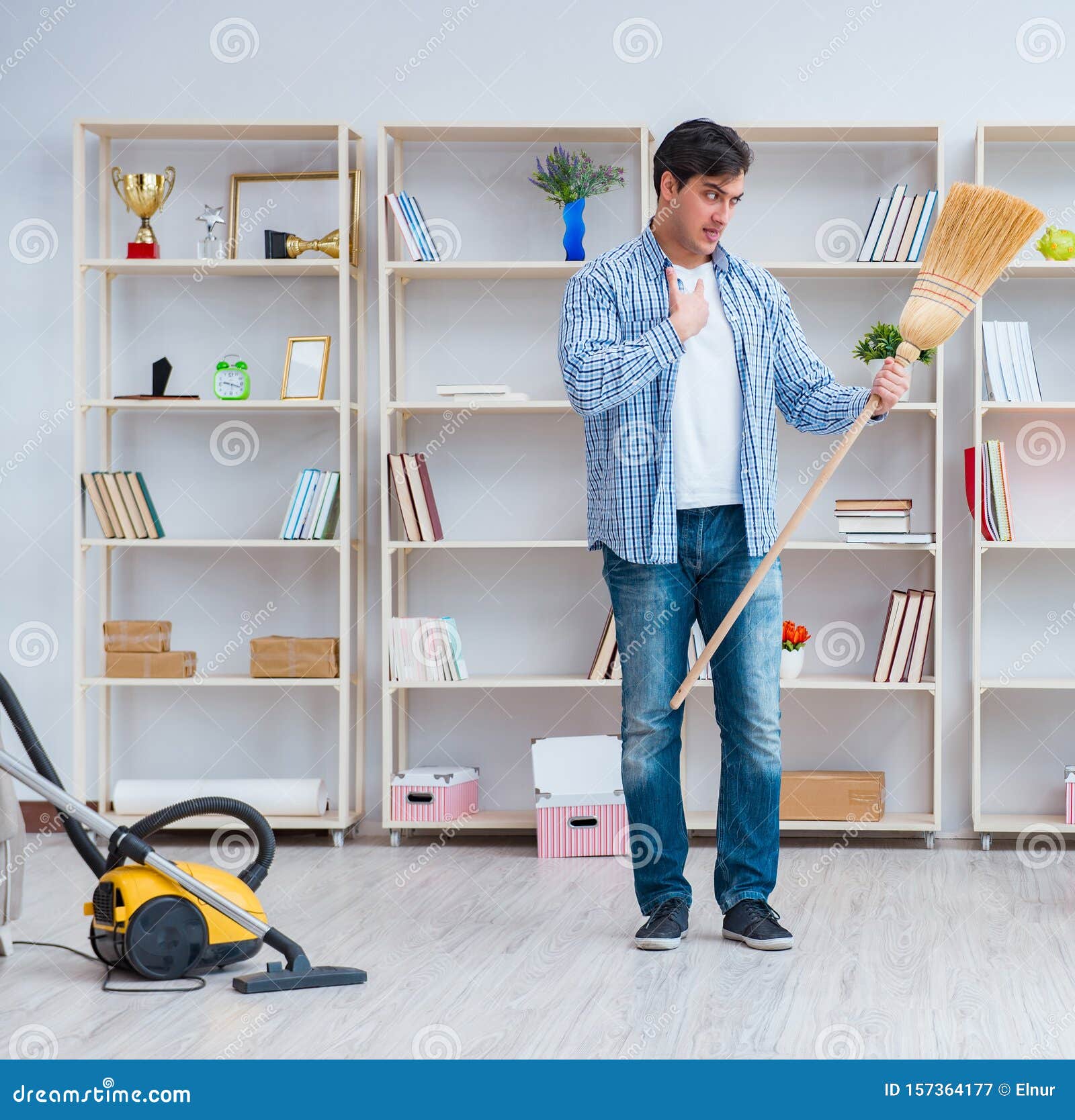 Man doing cleaning at home stock image. Image of housecleaning - 157364177