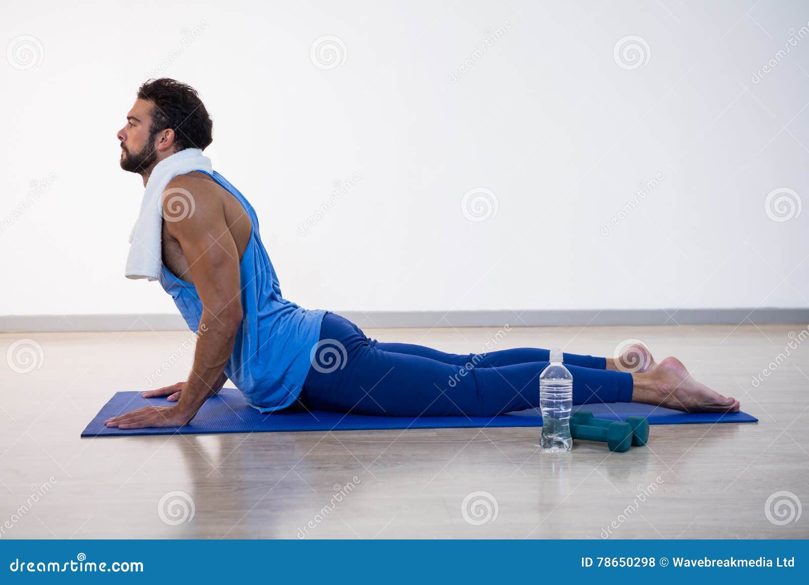 Man Doing Cobra Pose on Exercise Mat Stock Photo - Image of adult ...