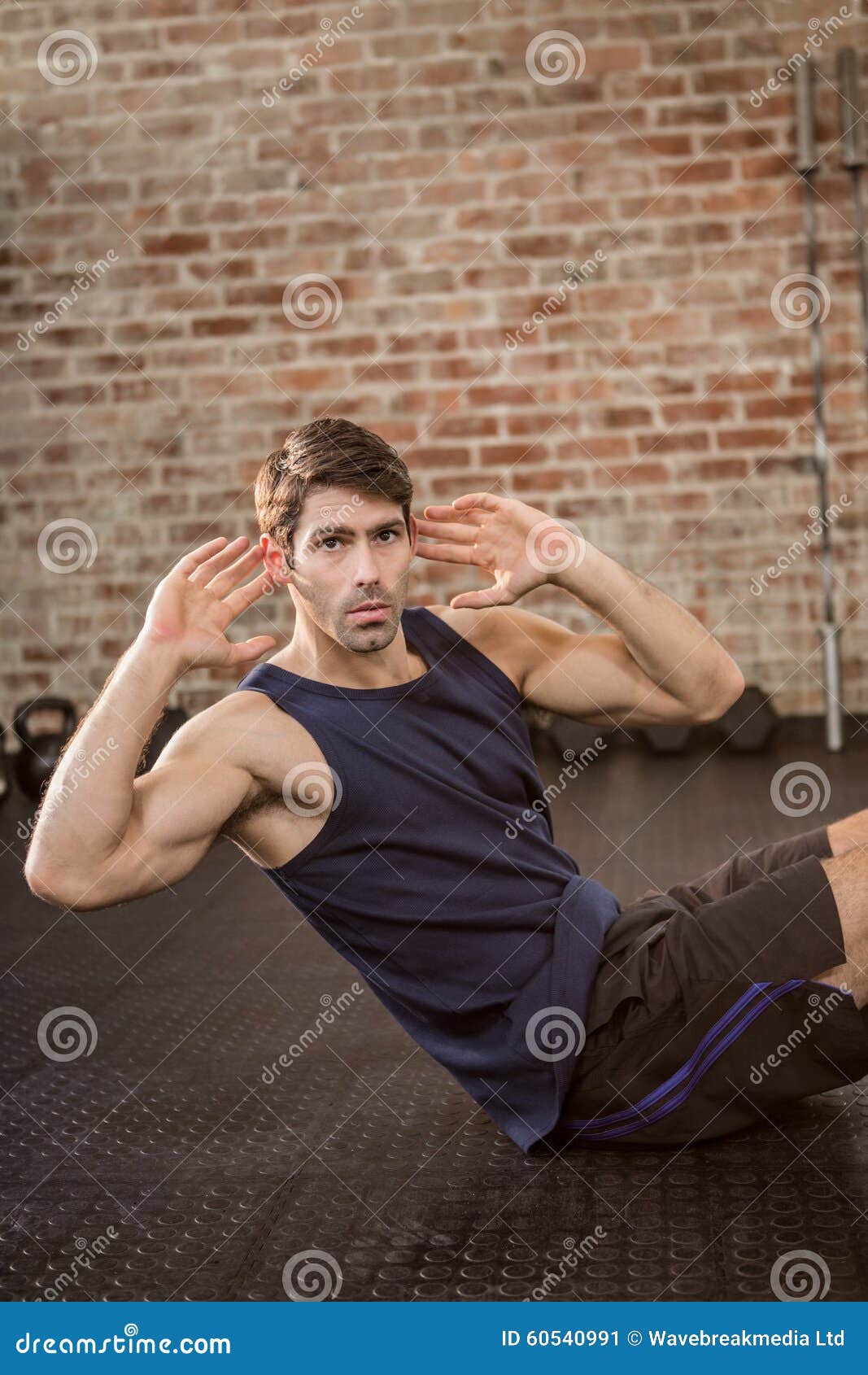 Man doing crunches stock image. Image of instructor, room - 60540991