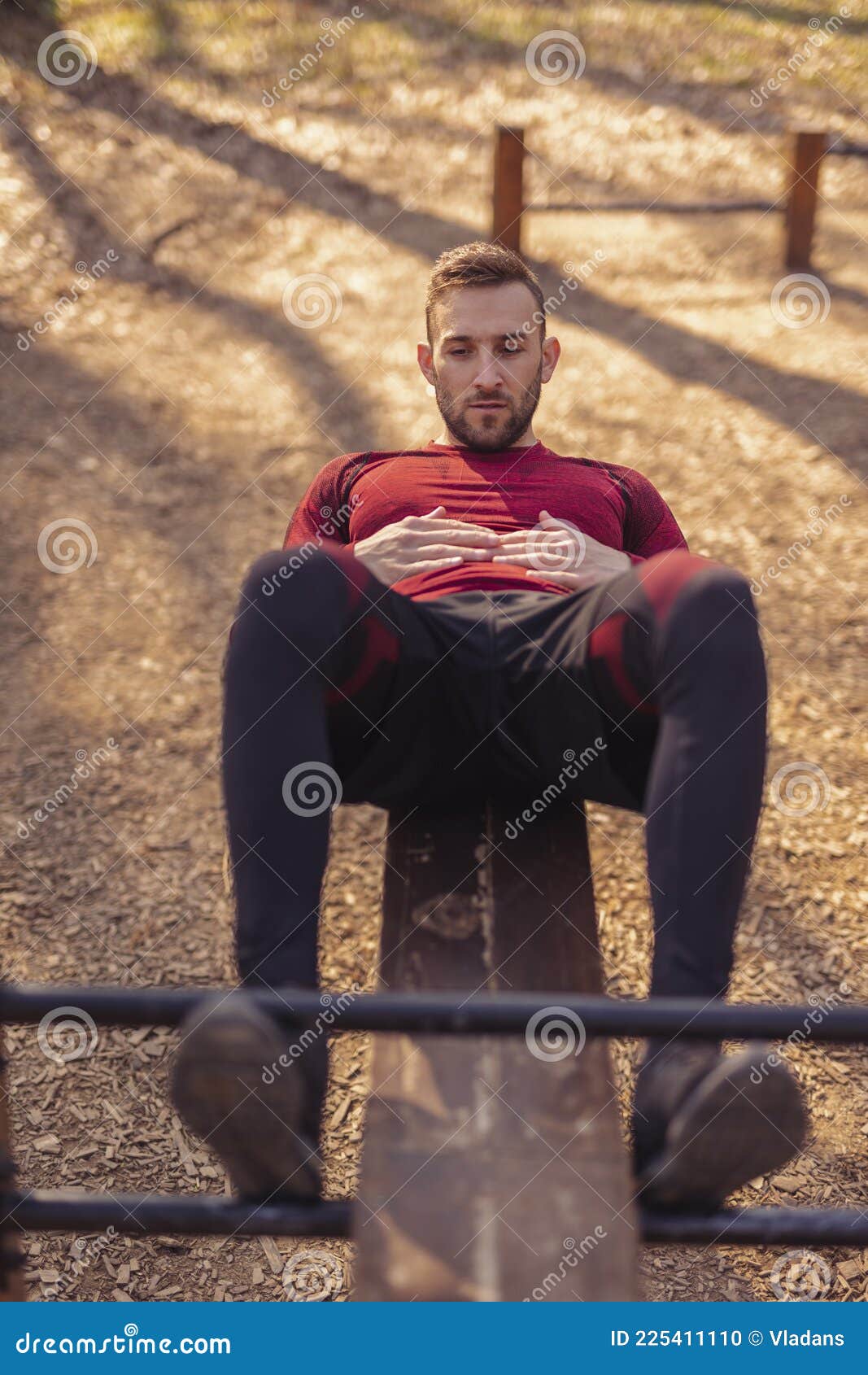 Man Doing Crunches in Street Workout Park Stock Photo - Image of effort ...