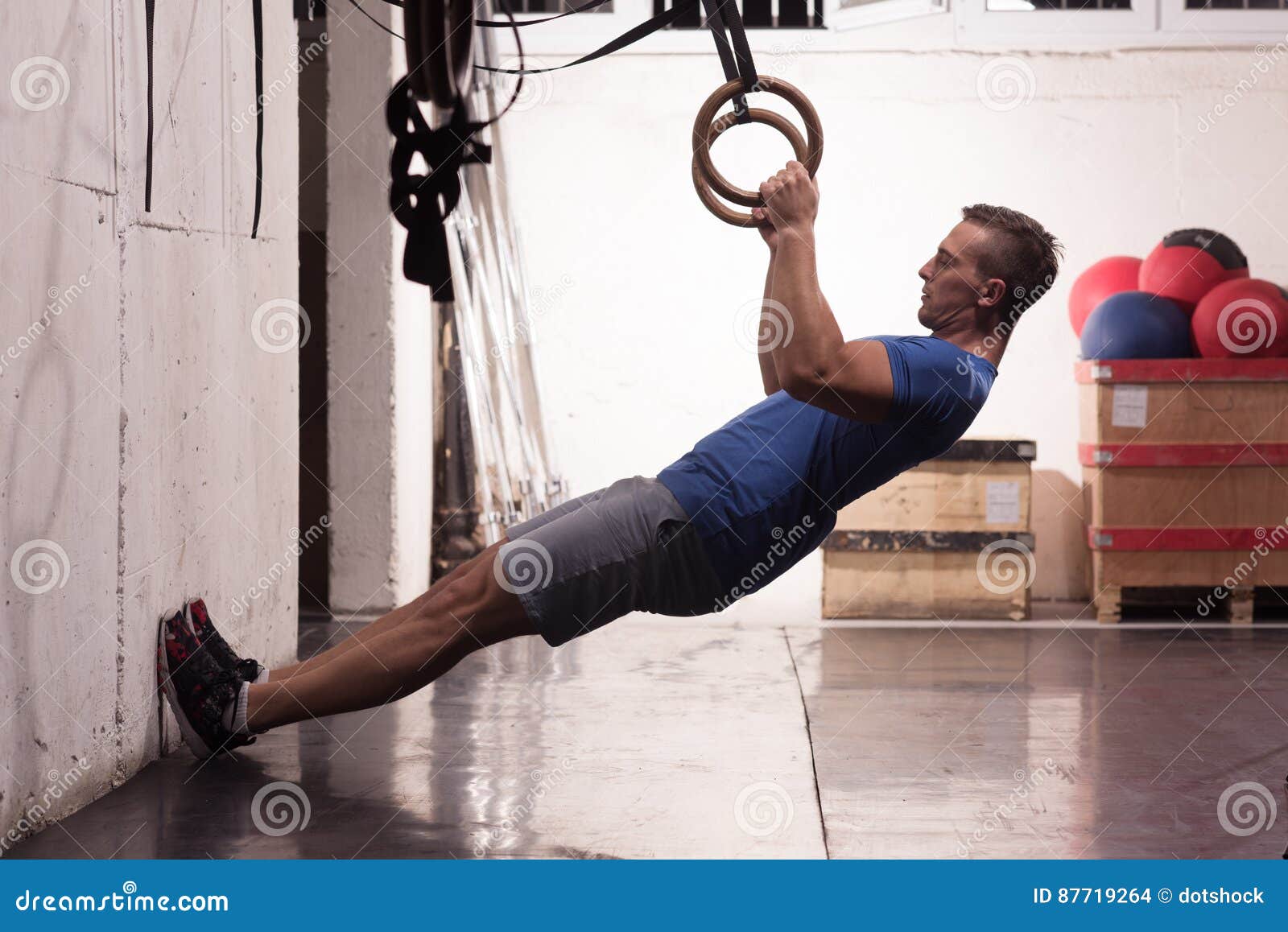 Man doing dipping exercise stock photo. Image of dangling - 87719264