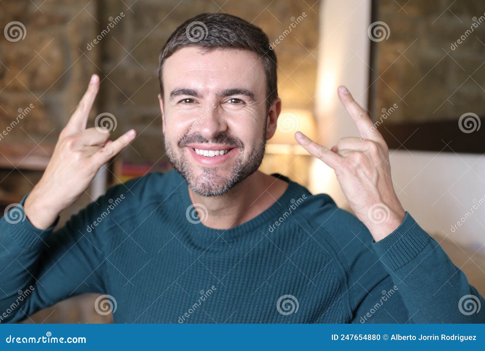 Man Doing Double Horn Gesture Stock Photo - Image of finger, aggressive ...