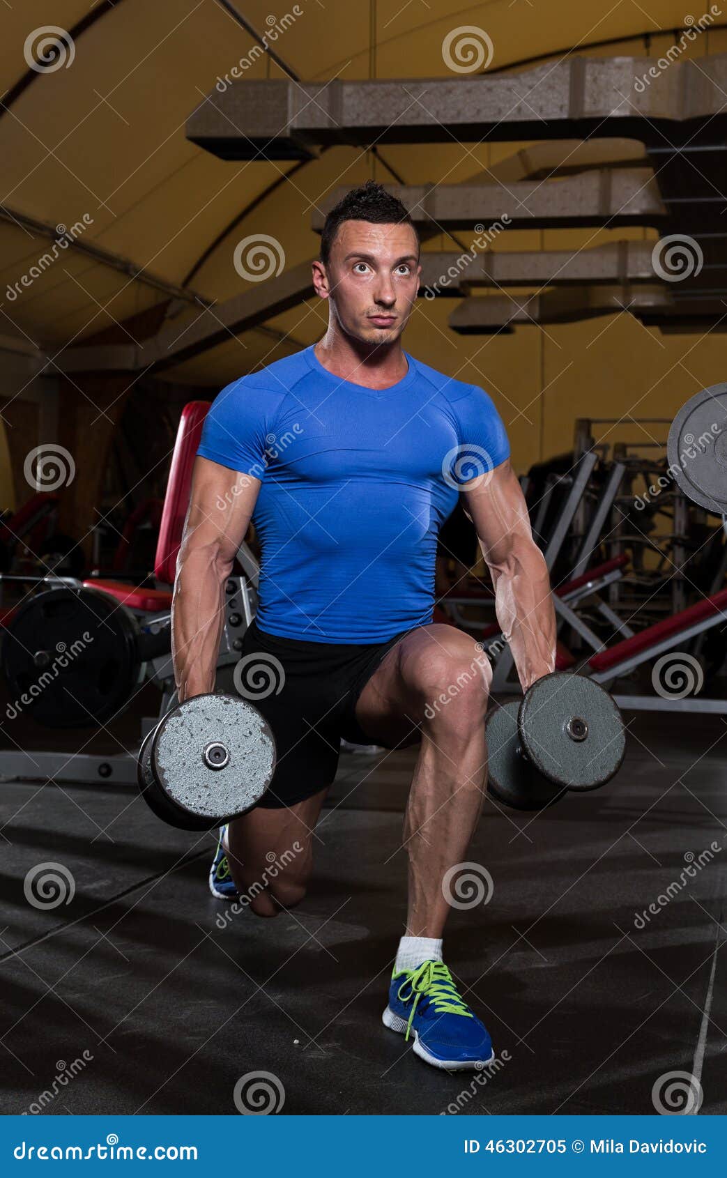 Man Doing Dumbbell Lunges stock image. Image of build - 46302705 Man Doing Dumbbell Lunges stock image. Image of build - 46302705