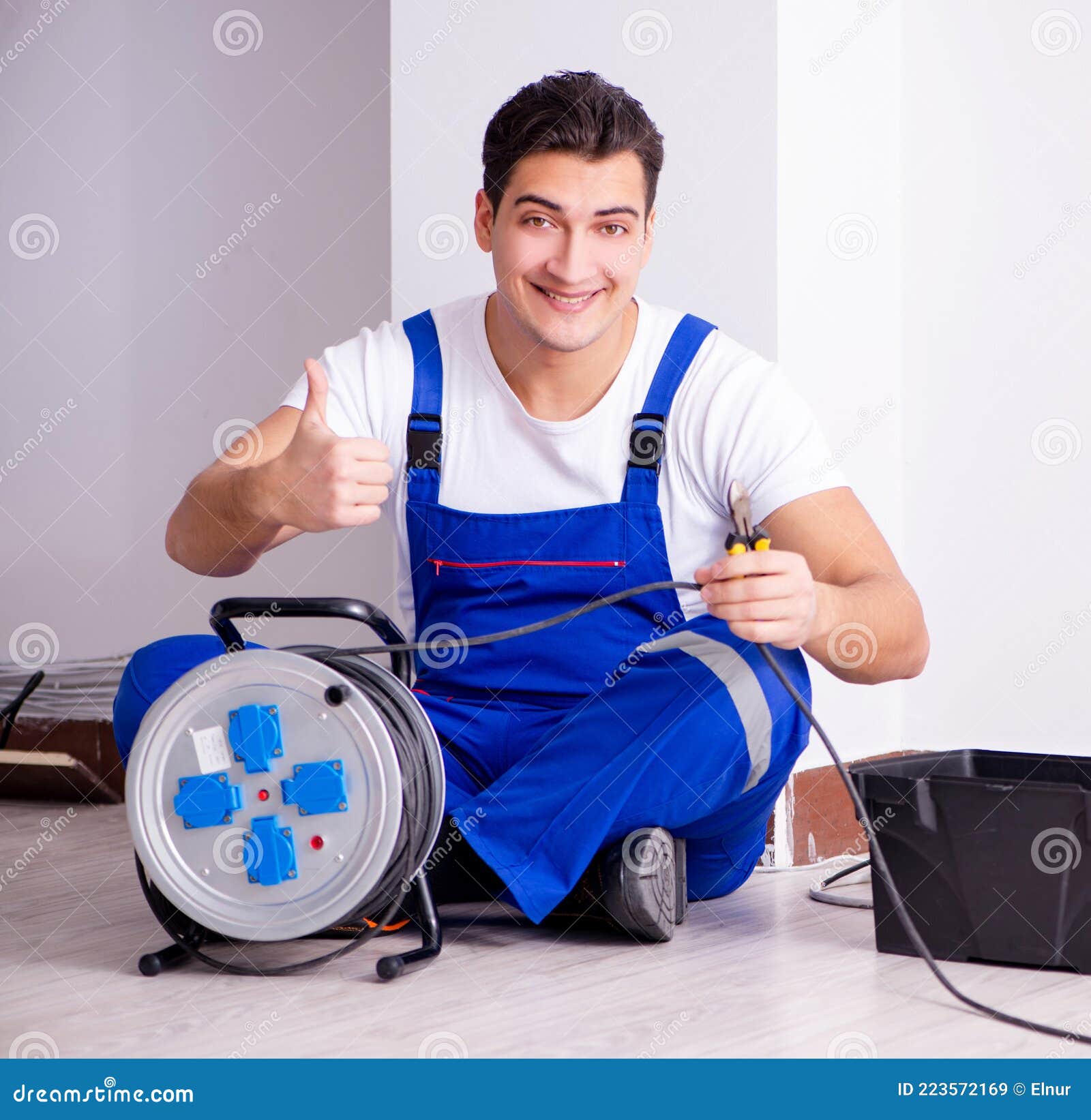 Man Doing Electrical Repairs at Home Stock Image - Image of electrician ...
