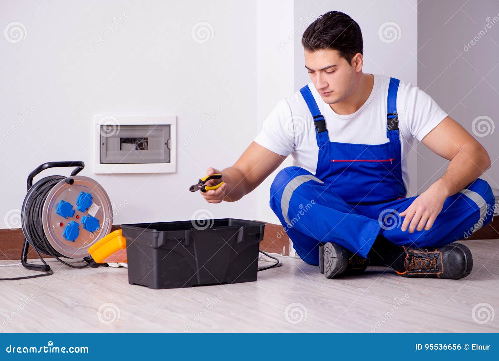 The Man Doing Electrical Repairs at Home Stock Photo - Image of ...