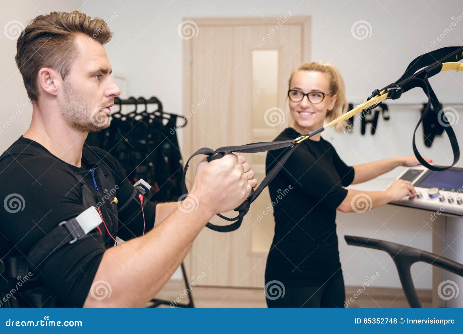 Man Doing Ems Training and His Coach Stock Photo - Image of model ...