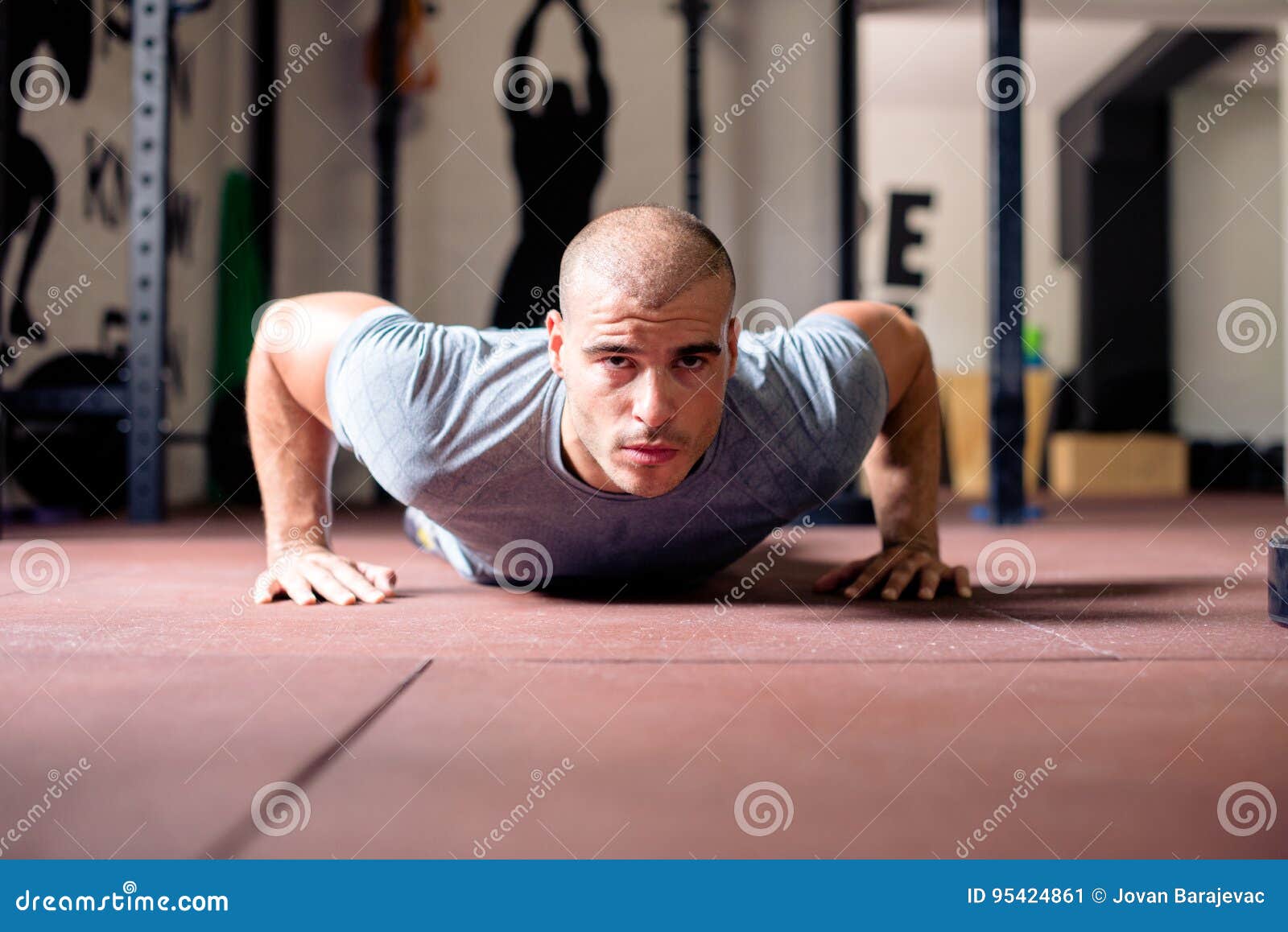 Man Doing Exercise on Floor Stock Image - Image of active, floor: 95424861