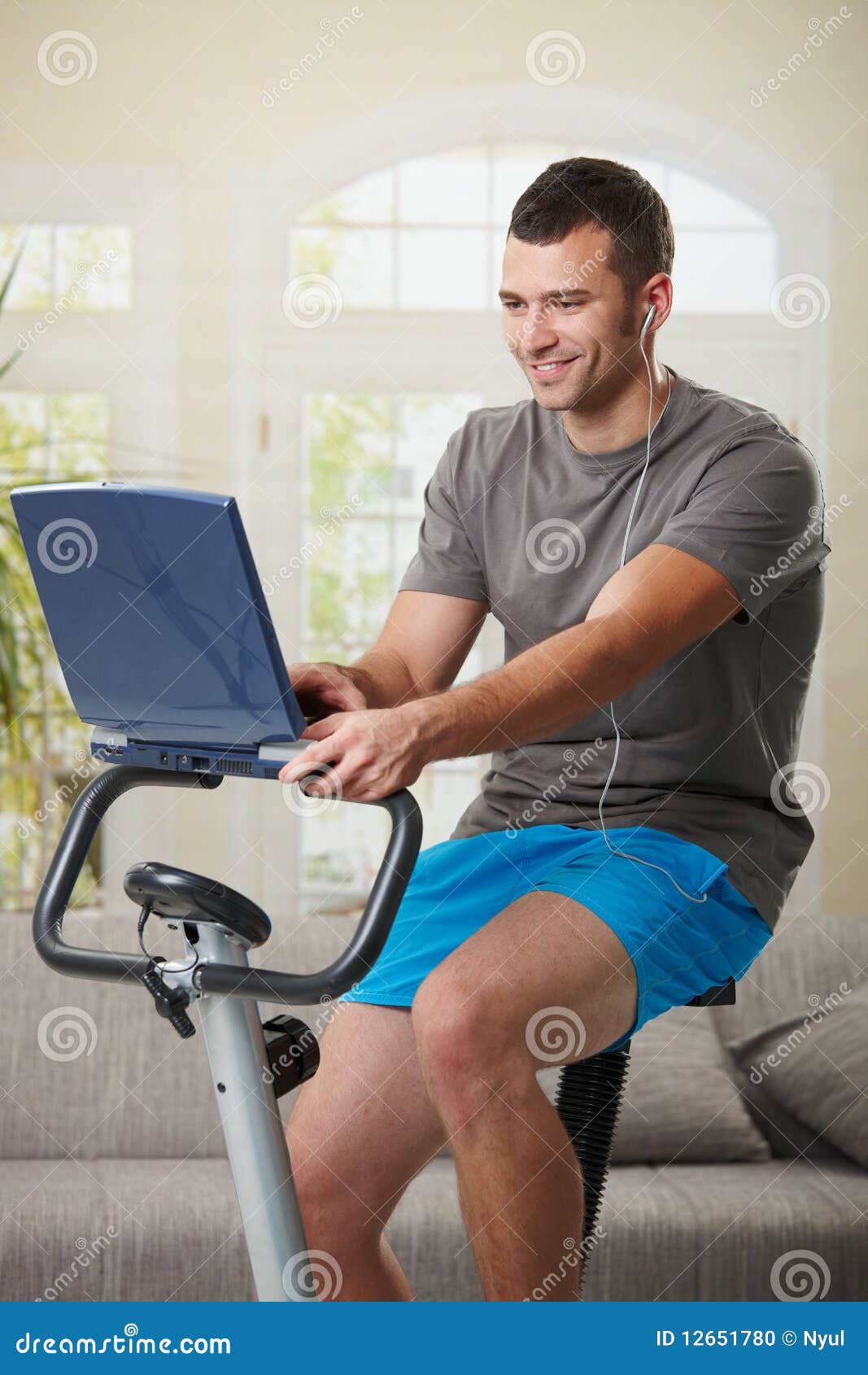 Man doing exercise at home stock photo. Image of comfort - 12651780