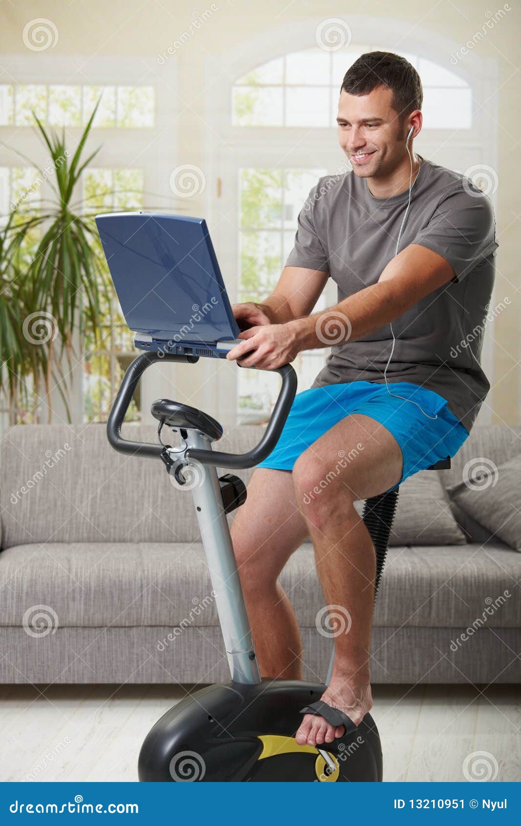 Man doing exercise at home stock image. Image of hearing - 13210951