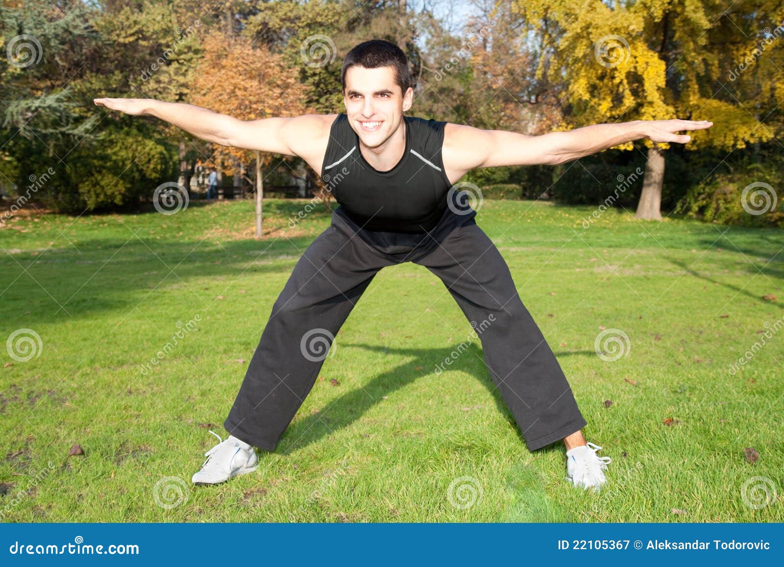 Man doing exercise in park stock image. Image of casual - 22105367