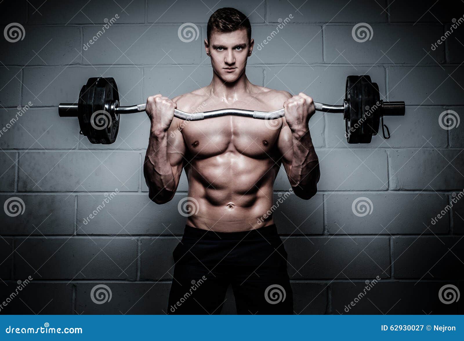 Man Doing Exercises with Barbell in the Gym S Studio Stock Image ...