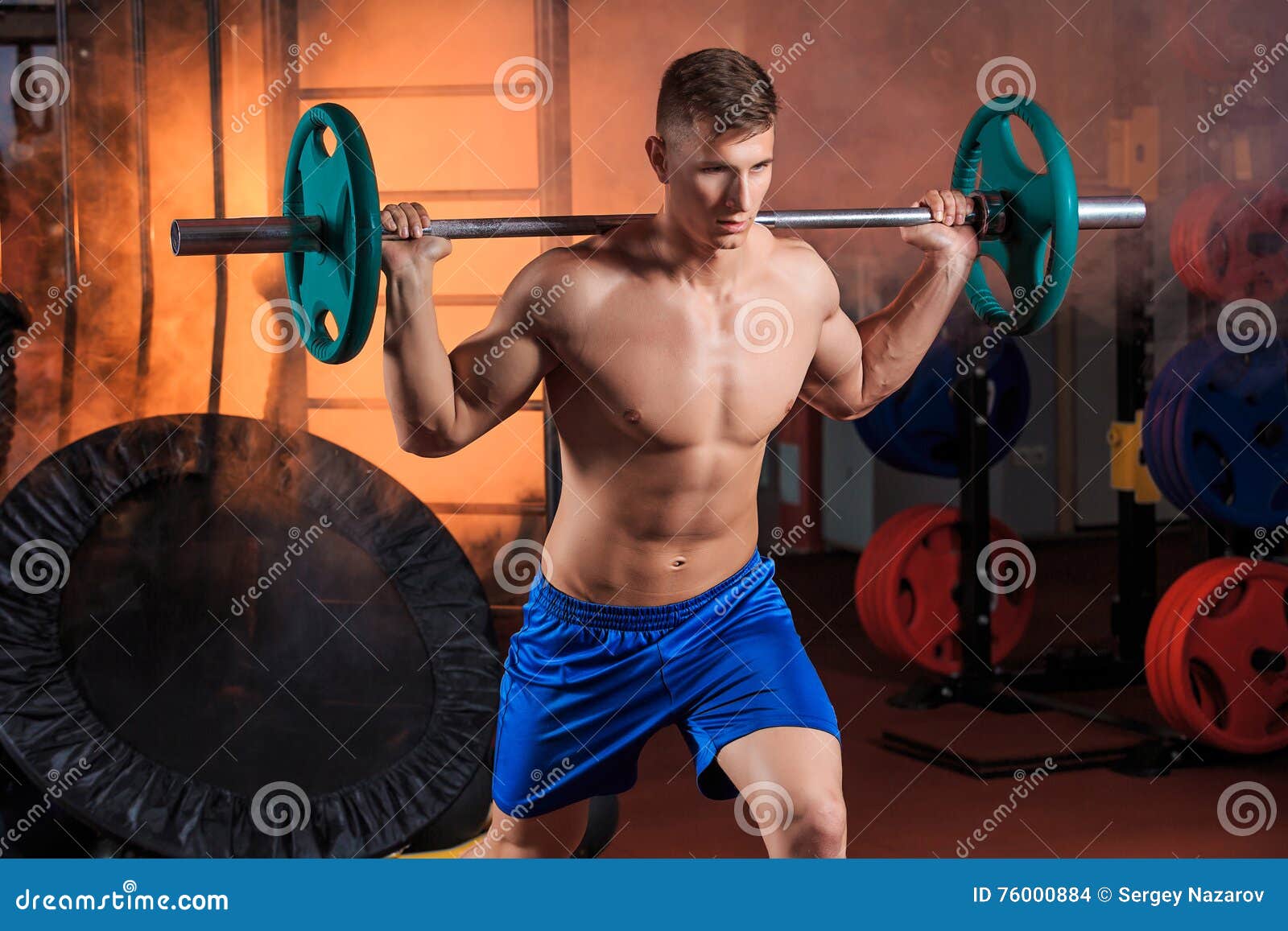 Man Doing Exercises with Barbell Stock Photo - Image of handsome ...
