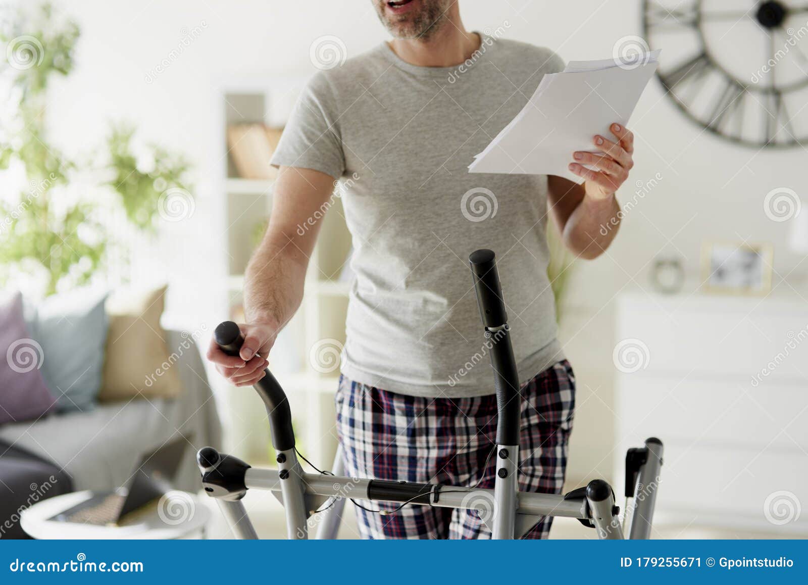 Man Doing Exercises and Checking Documents Stock Image - Image of ... Man Doing Exercises and Checking Documents Stock Image - Image of ...