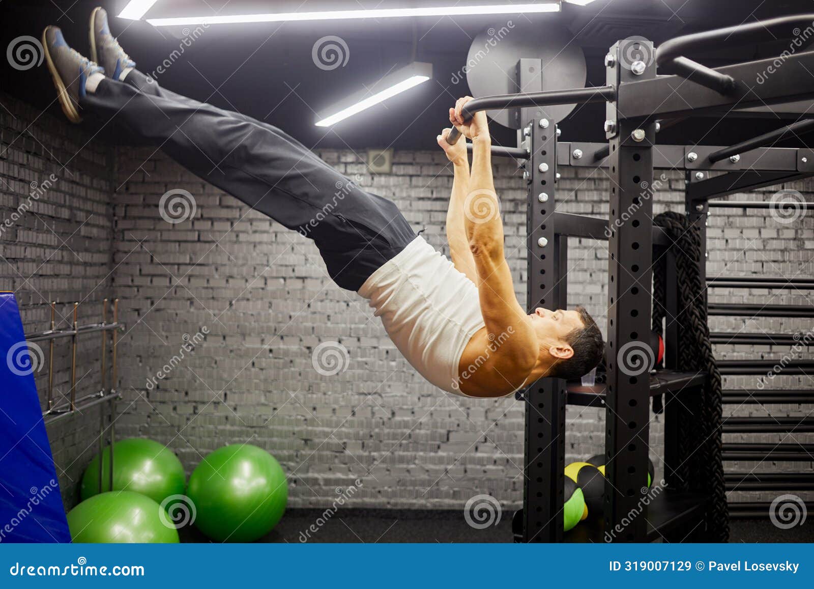 Man Doing Exercises on Horizontal Bar in Stock Image - Image of person ...