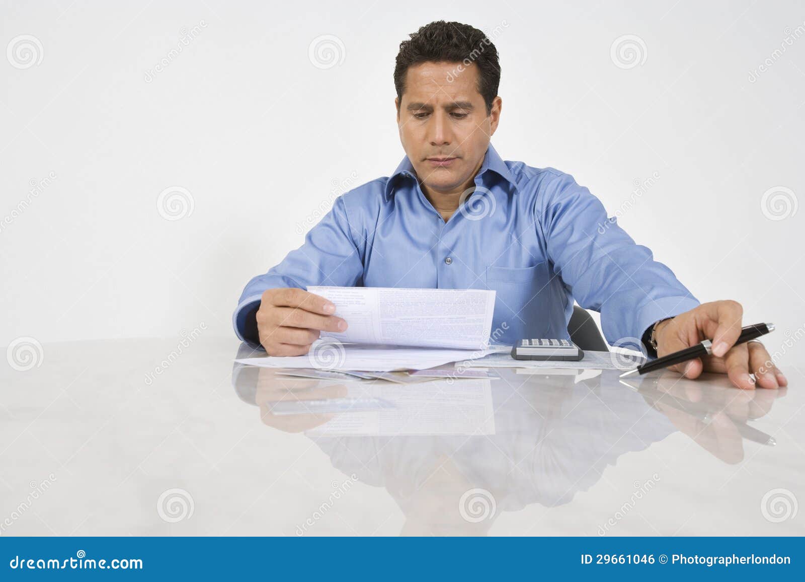 Man Doing Finances stock photo. Image of looking, mixed - 29661046