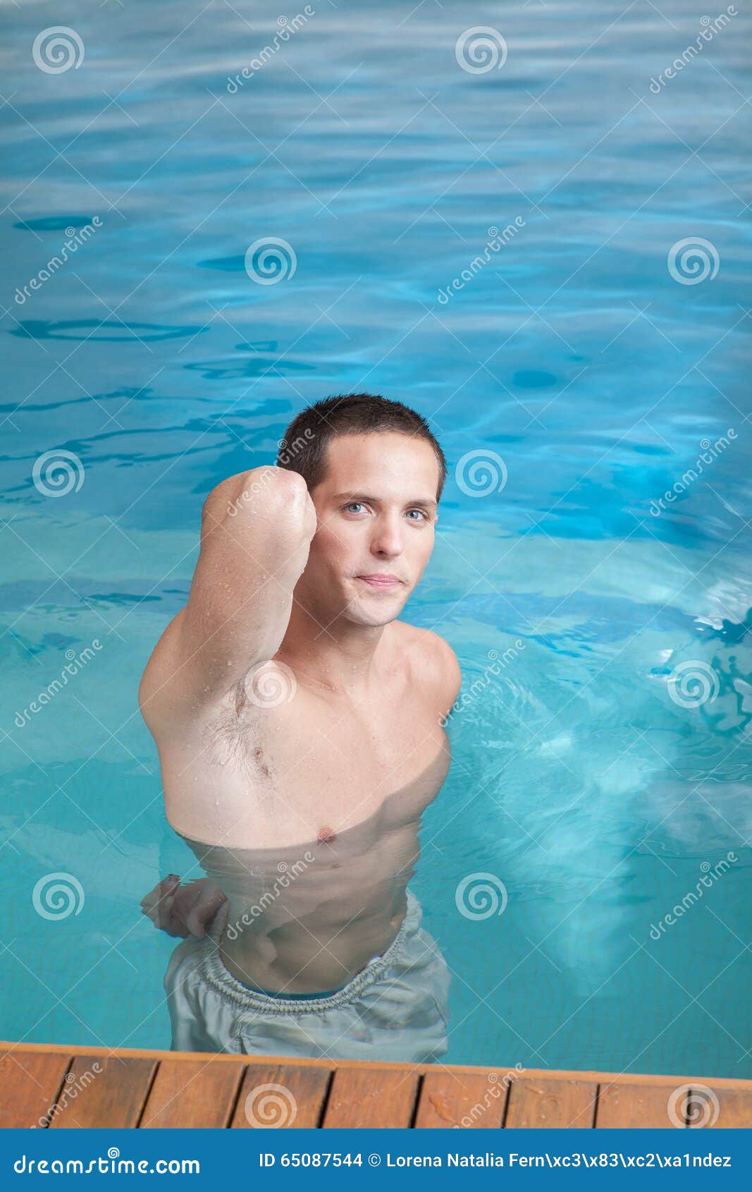Man Doing Gymnastics Inside the Pool Stock Photo - Image of front ...