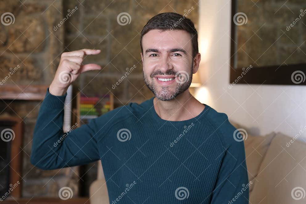Man Doing Hand Gesture that Shows Small Size Stock Photo - Image of ...