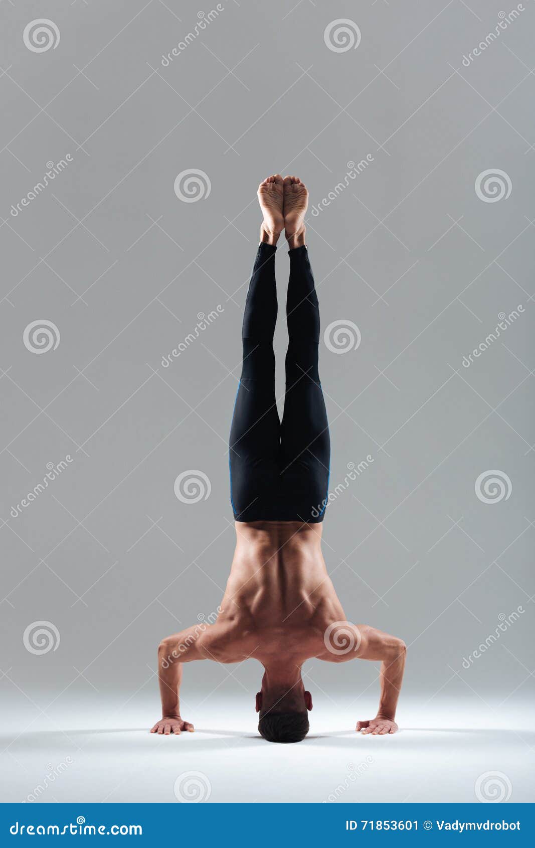 Man doing headstand stock image. Image of flexible, flexibility - 71853601