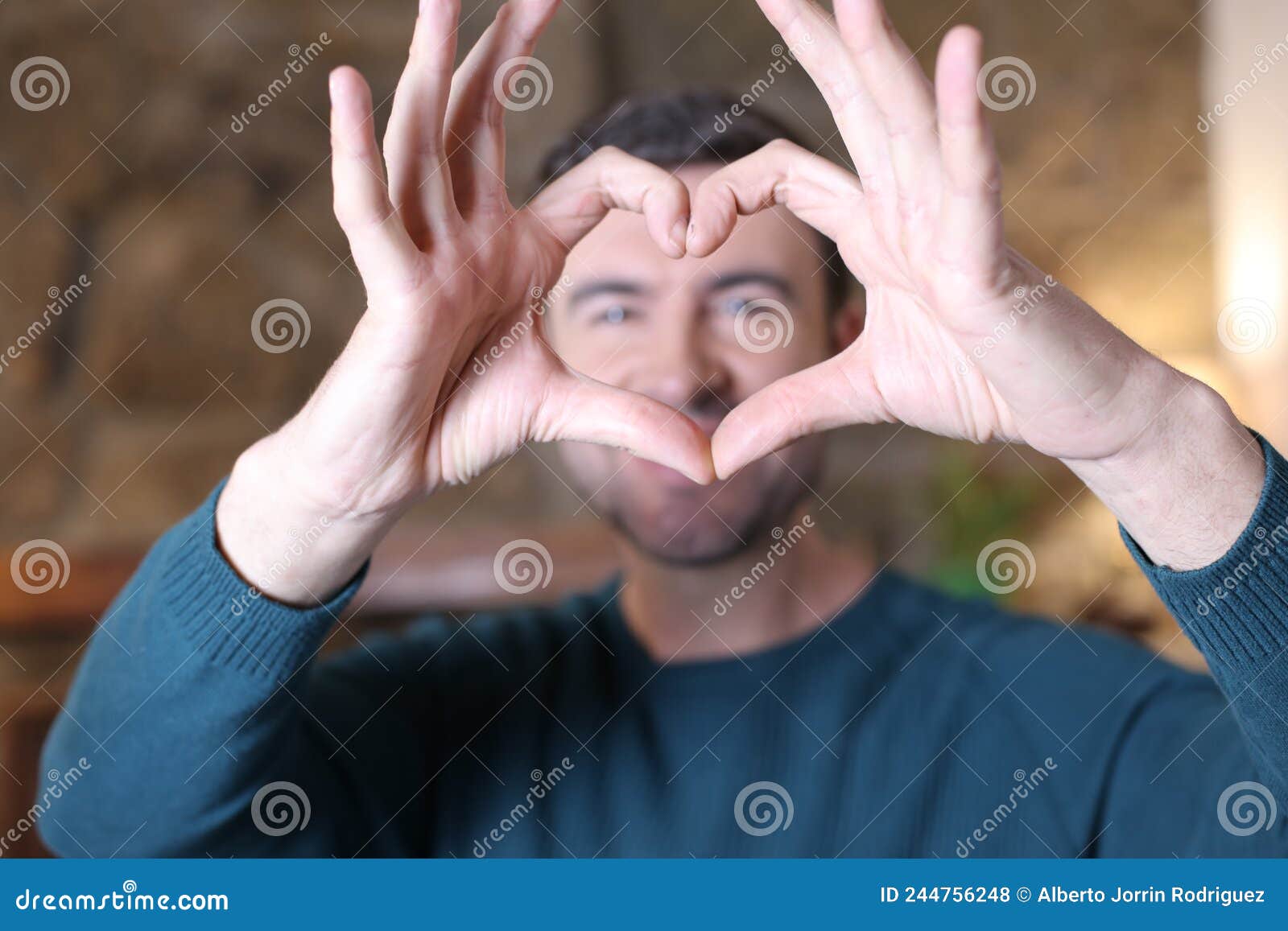 Man Doing Heart Shape with Fingers Stock Photo - Image of expression ...