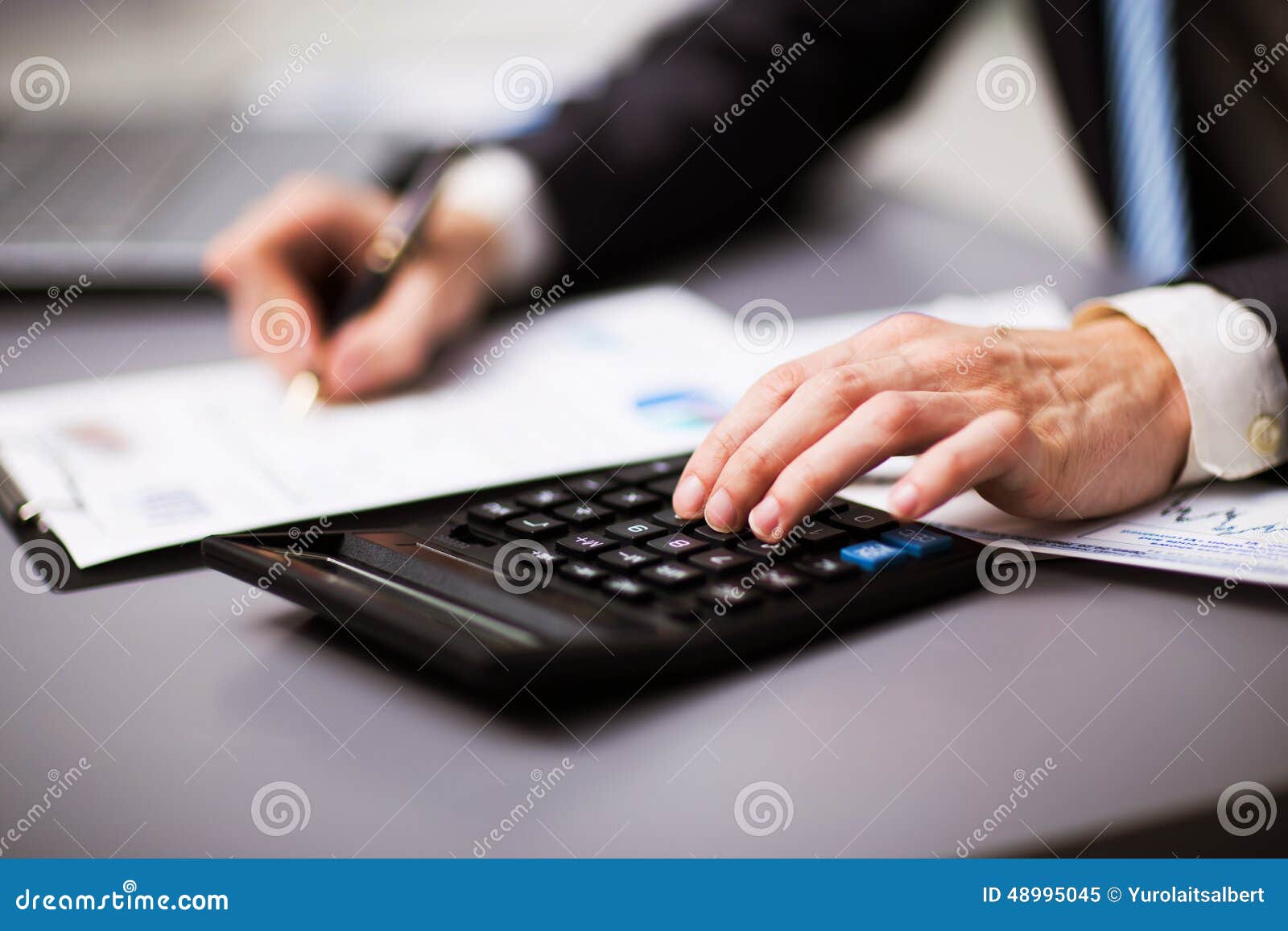 Man doing his accounting stock image. Image of computer - 48995045