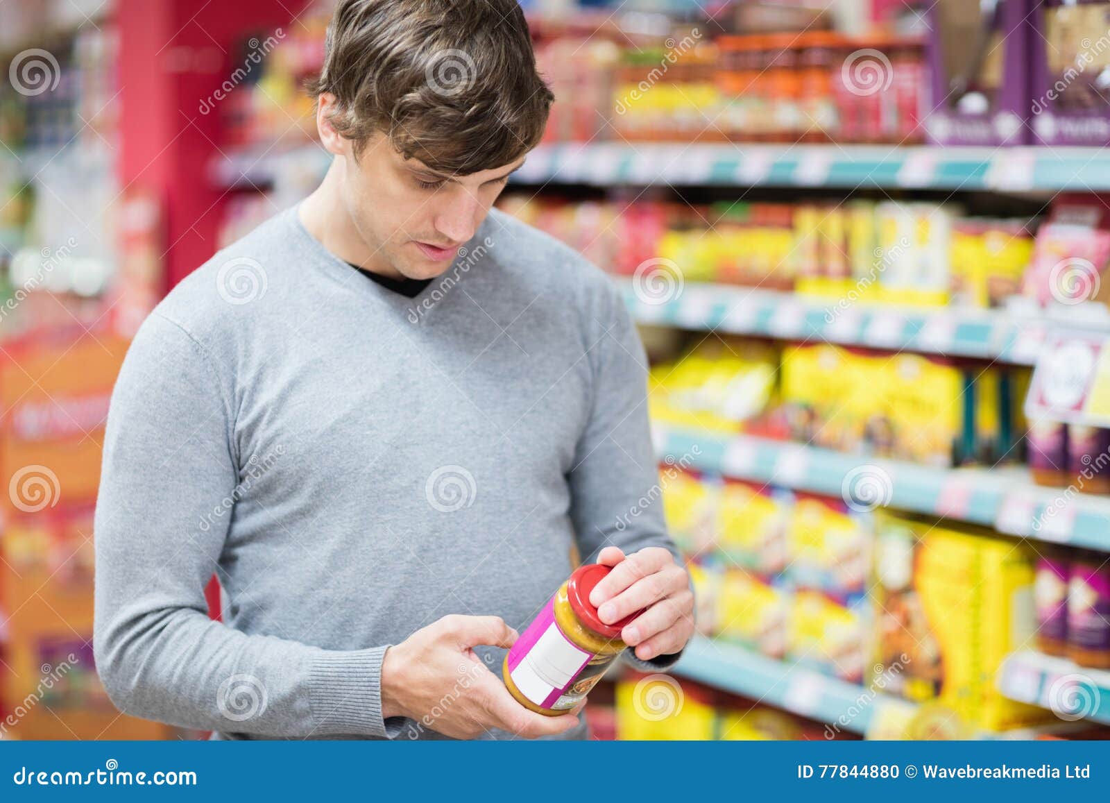 Man doing his groceries stock photo. Image of aisle, drink - 77844880