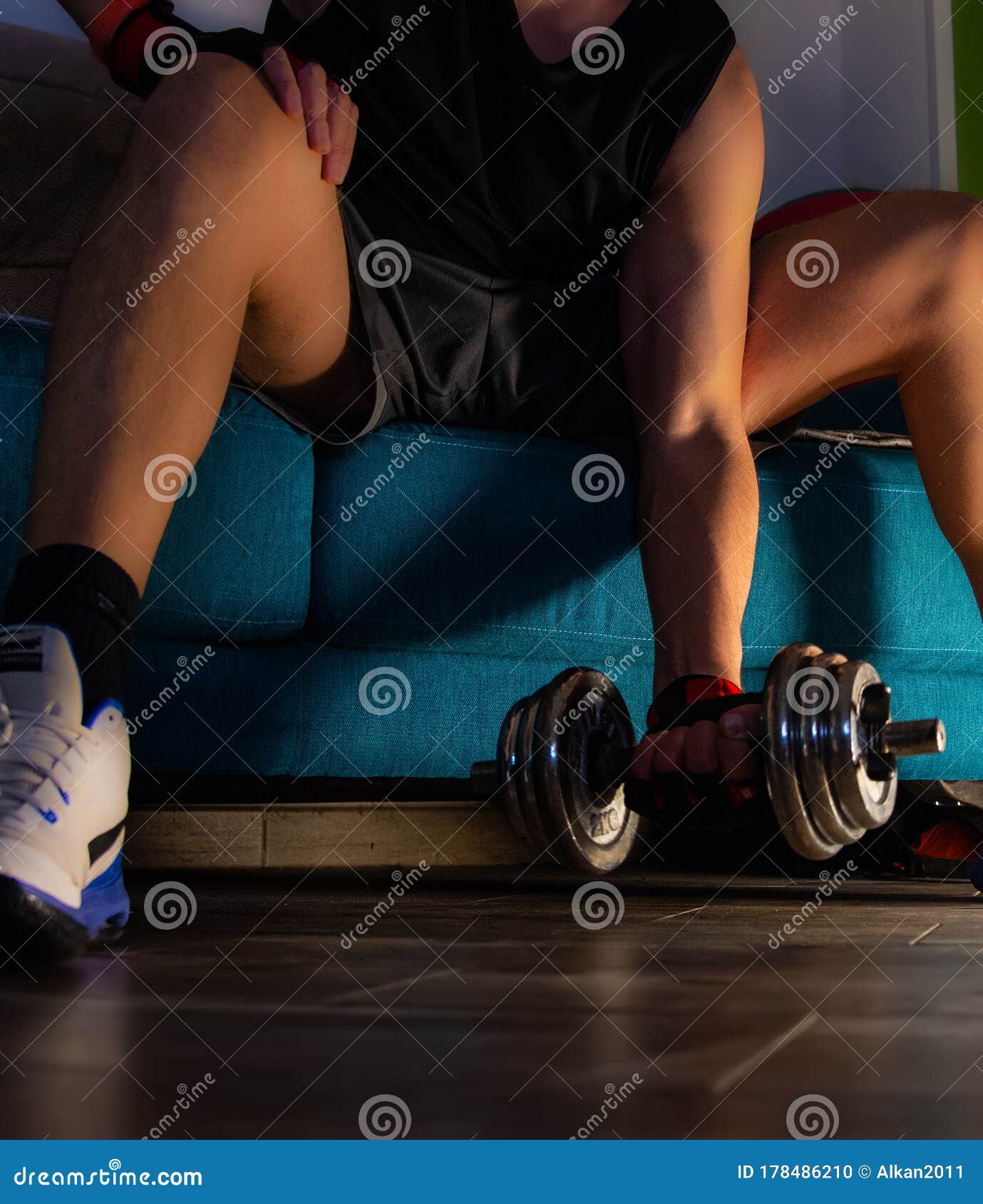 Man Doing Home Workout with a Metal Dumbbell Stock Photo - Image of ...