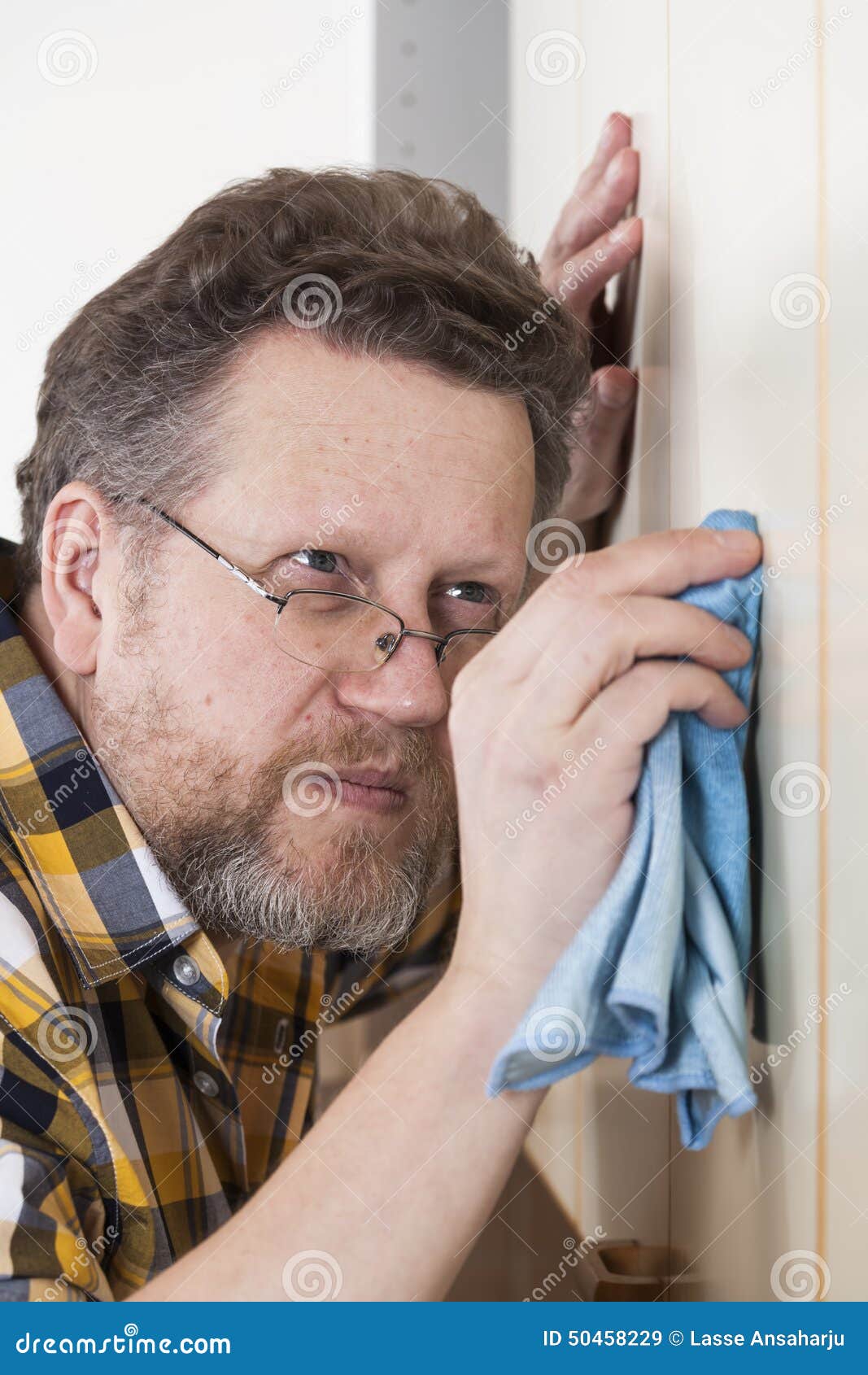 Man doing household chores stock image. Image of routine - 50458229