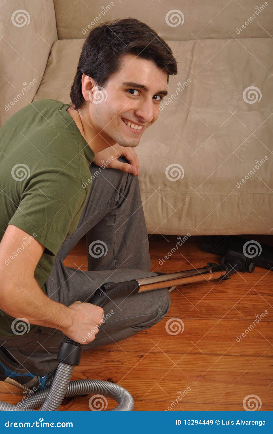 Man doing the housework stock image. Image of happy, dust - 15294449