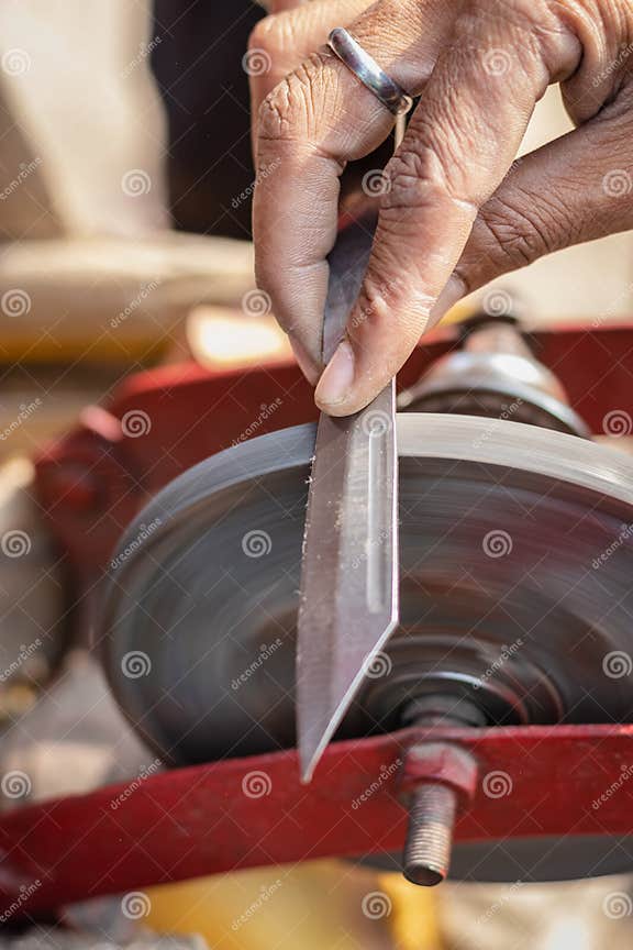 Man Doing Knife Sharpen at Iron Sharpener from Different Angle Stock ...