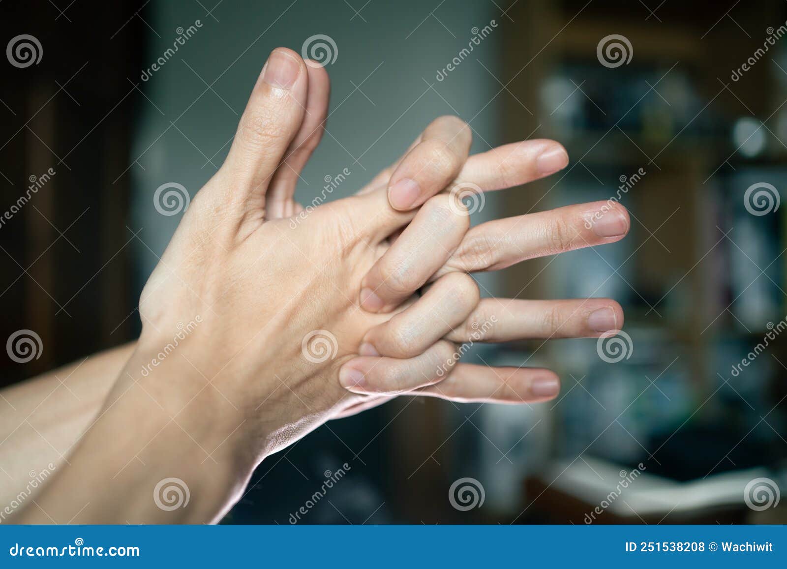 A Man Doing a Knuckle Cracking Stock Photo - Image of knuckle, finger ...