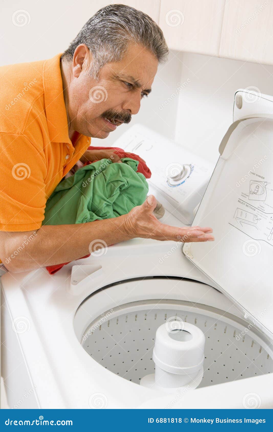 Man Doing Laundry stock photo. Image of latin, casual - 6881818