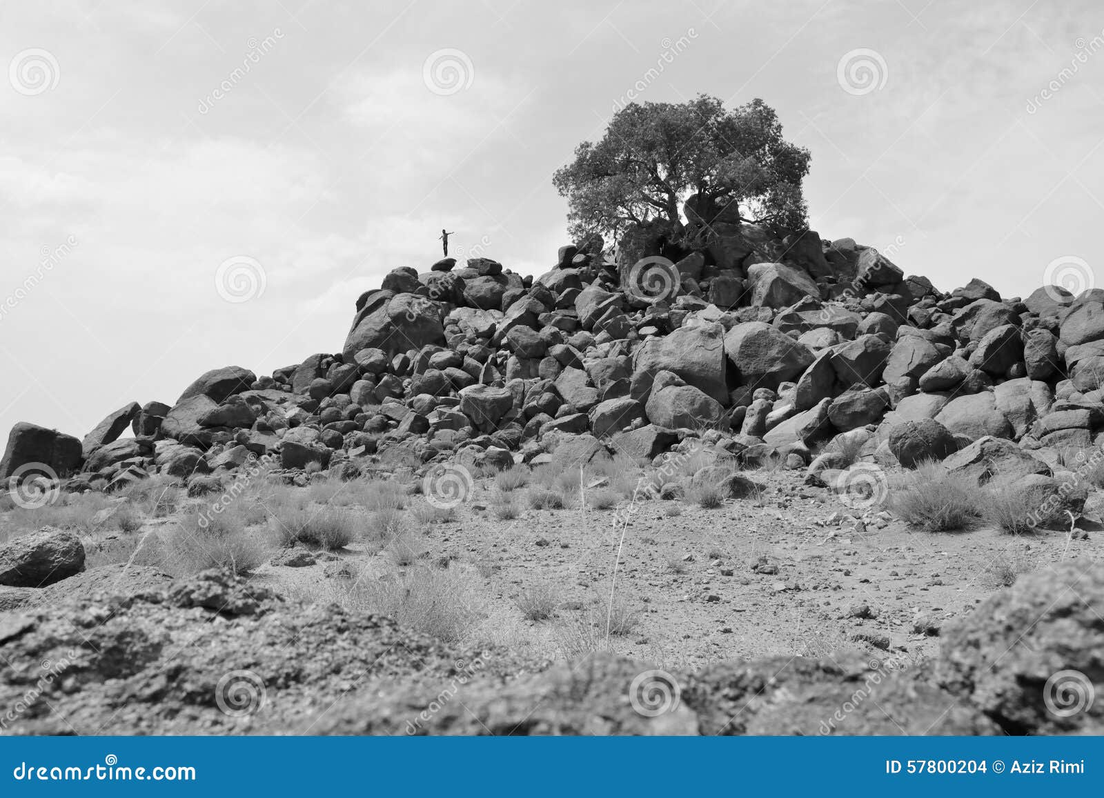 Man Doing Levitation on Rocks -B&W- Stock Photo - Image of rocks ...