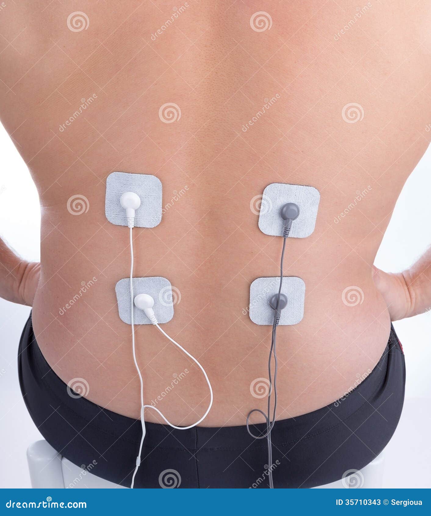 Man is Doing Massage of Electrostimulator for the Spine. Stock Image ...