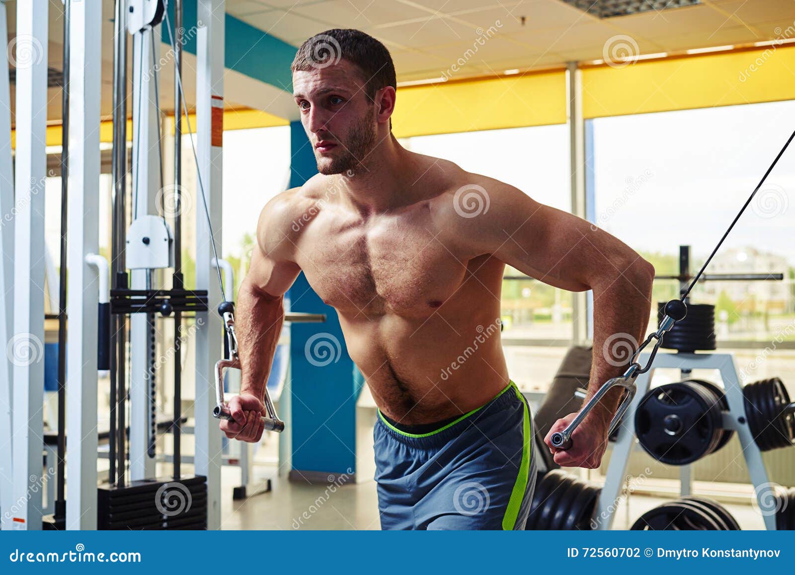 Man Doing Muscles Workout on Cable Crossover Machine Stock Photo ...