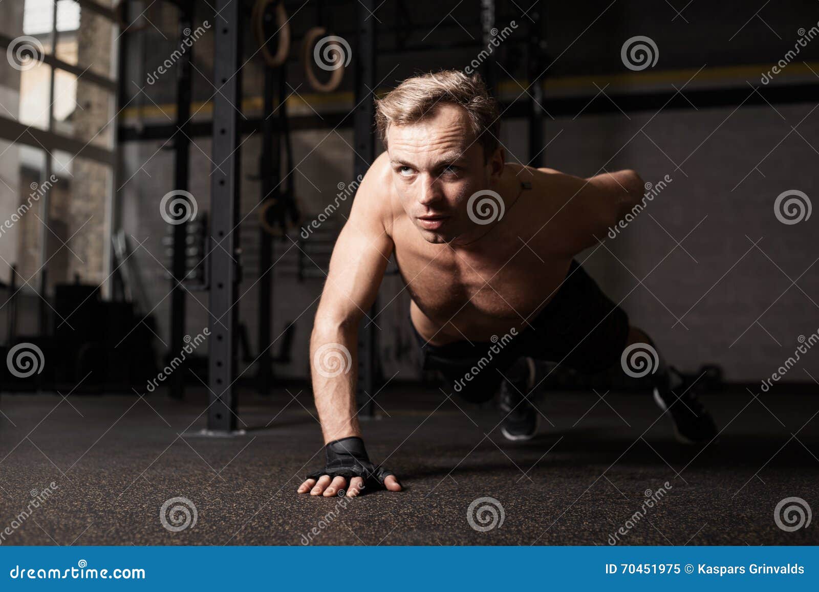 Man doing one hand push-up stock image. Image of health - 70451975