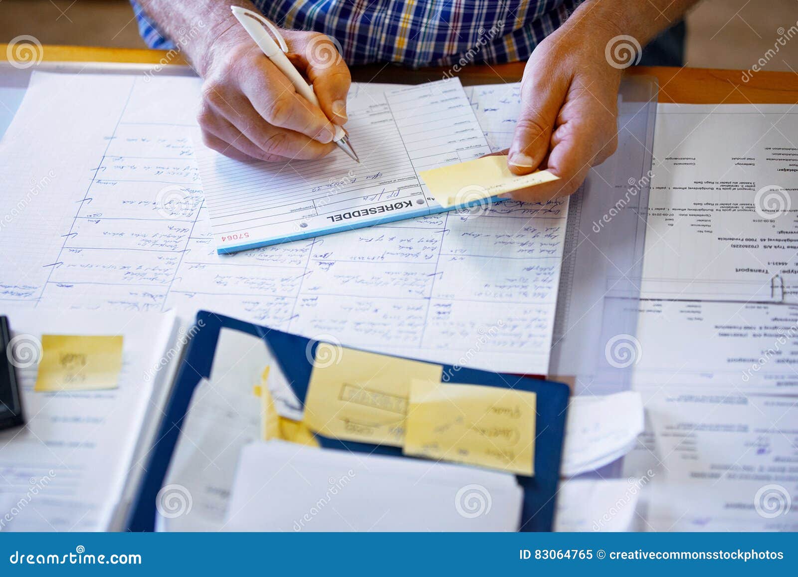 Man Doing Paperwork Picture. Image: 83064765
