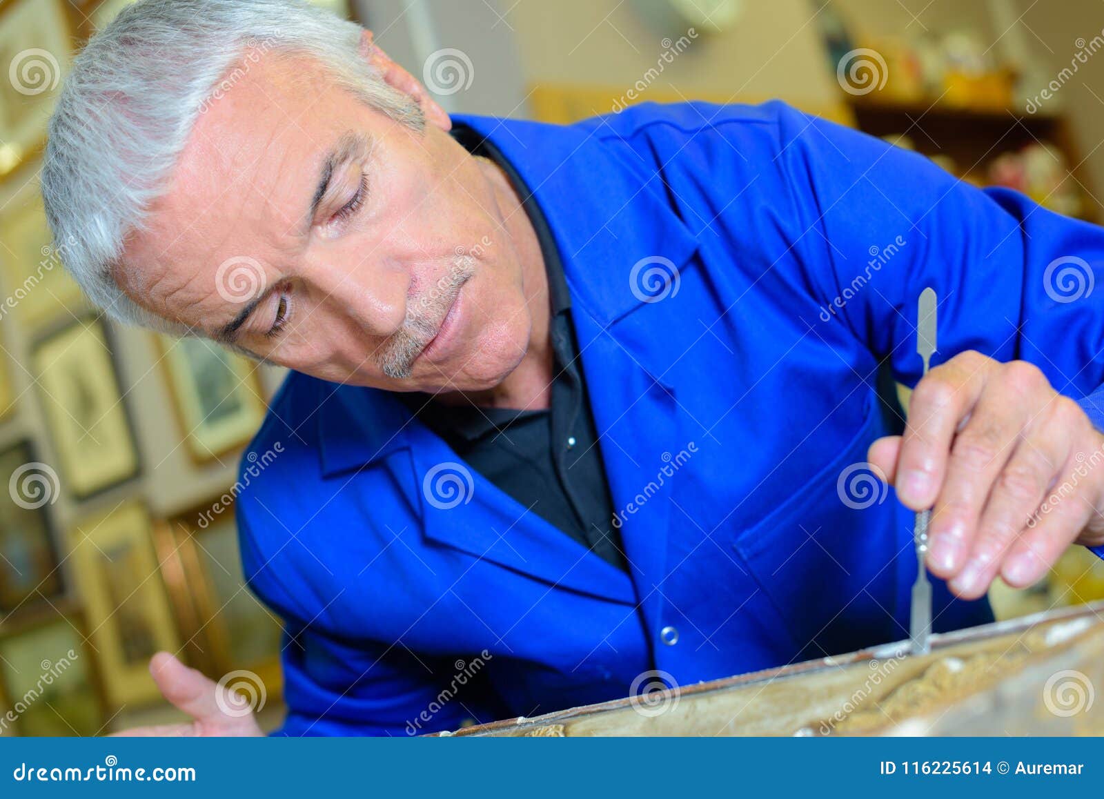 Man Doing Precision Restoration Work Stock Photo - Image of accuracy ...