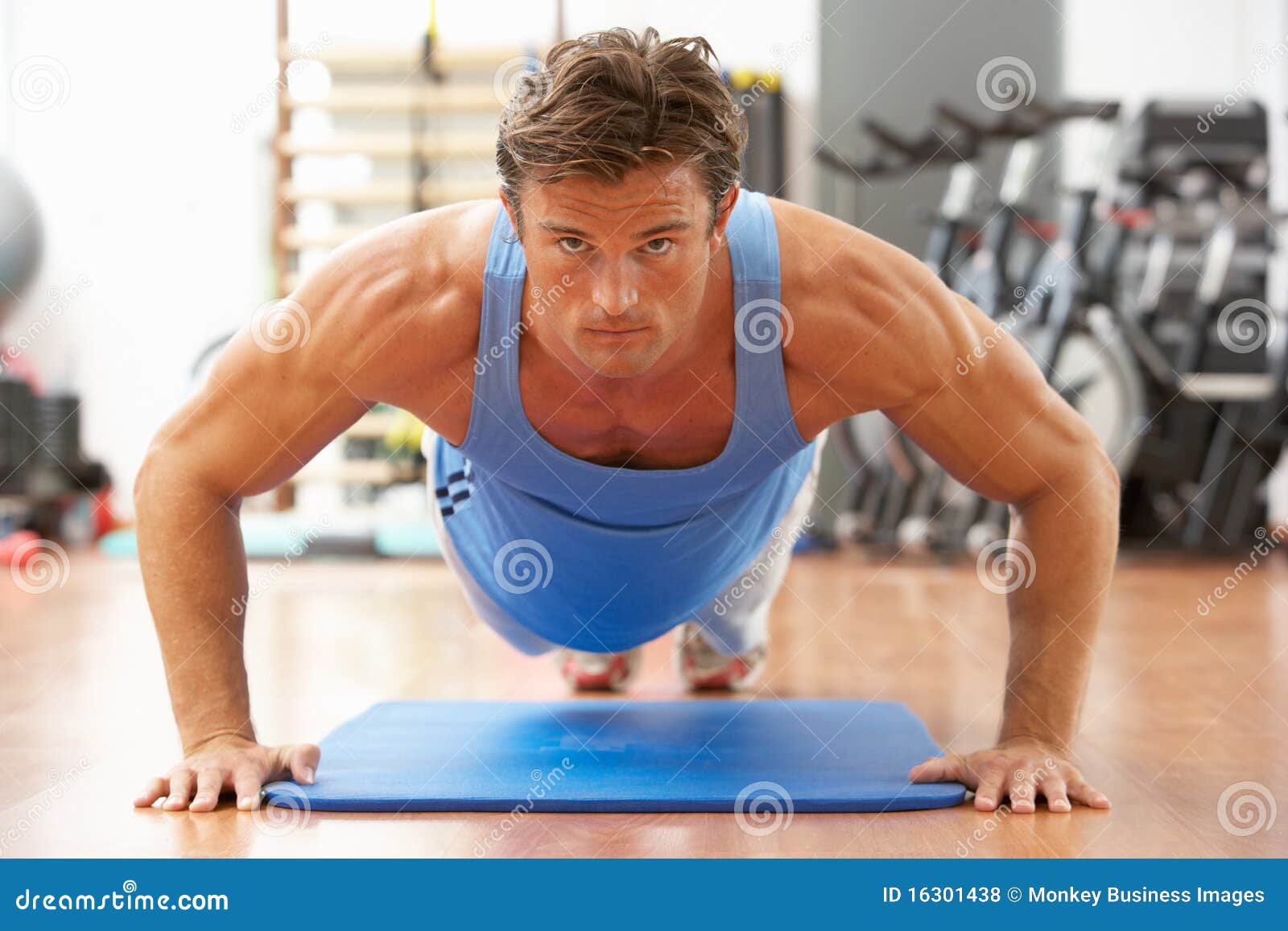 Man Doing Press Ups stock photo. Image of training, class - 16301438