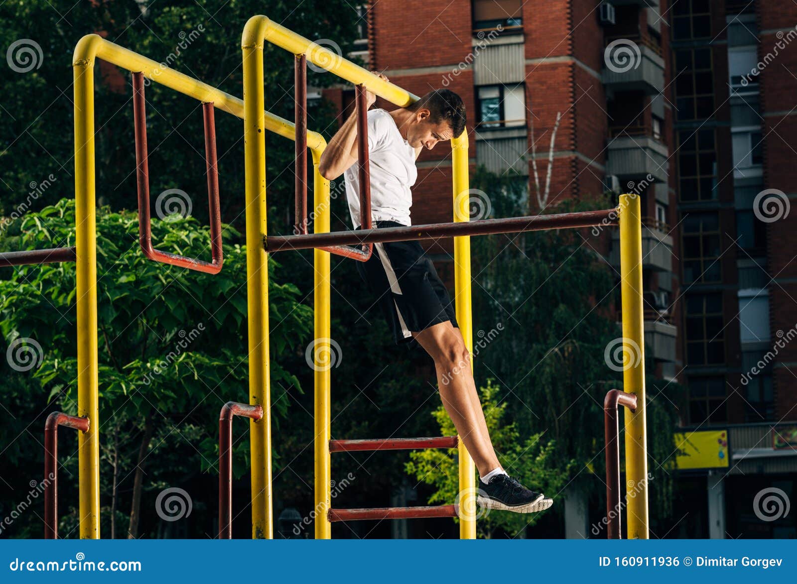 Man Doing Pull Ups on Bar at the Crossfit Gym Stock Photo - Image of ...