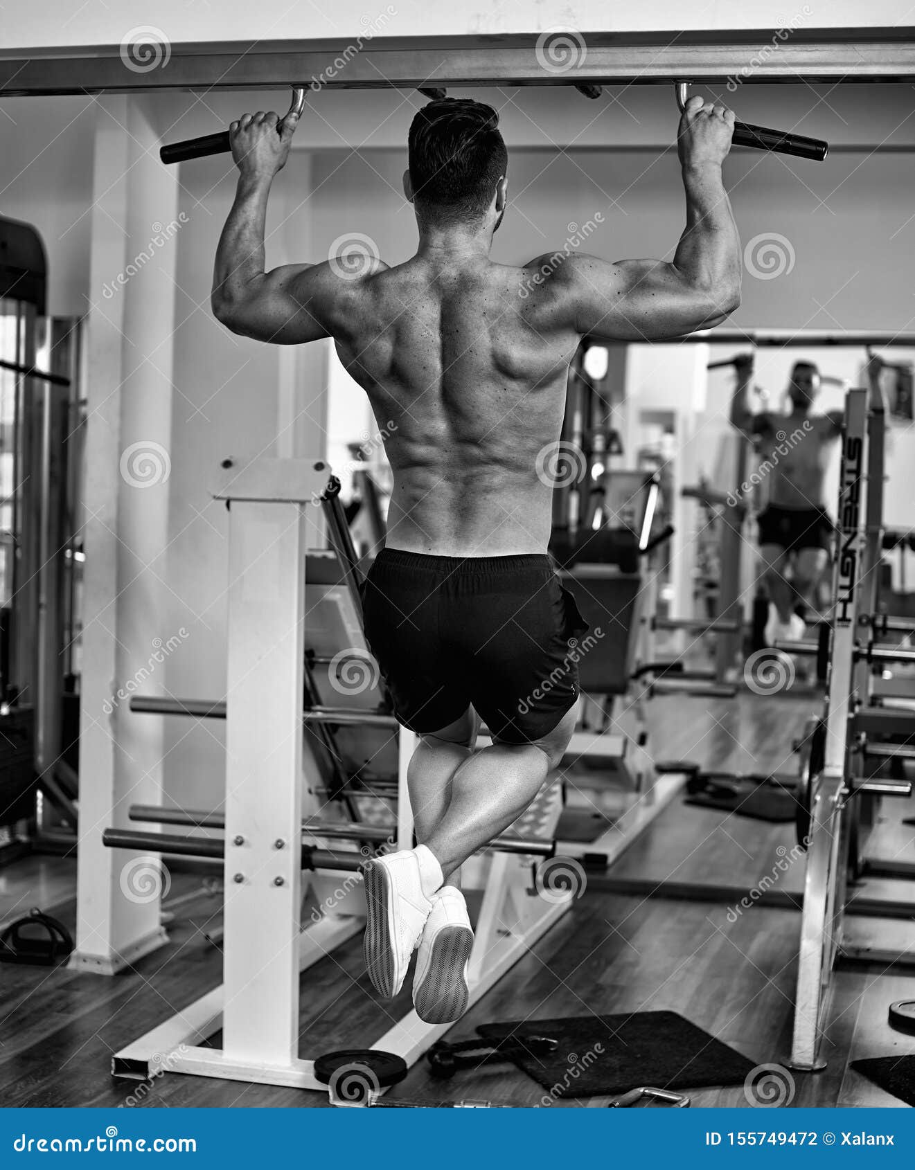 Man doing pull-ups stock photo. Image of back, male - 155749472