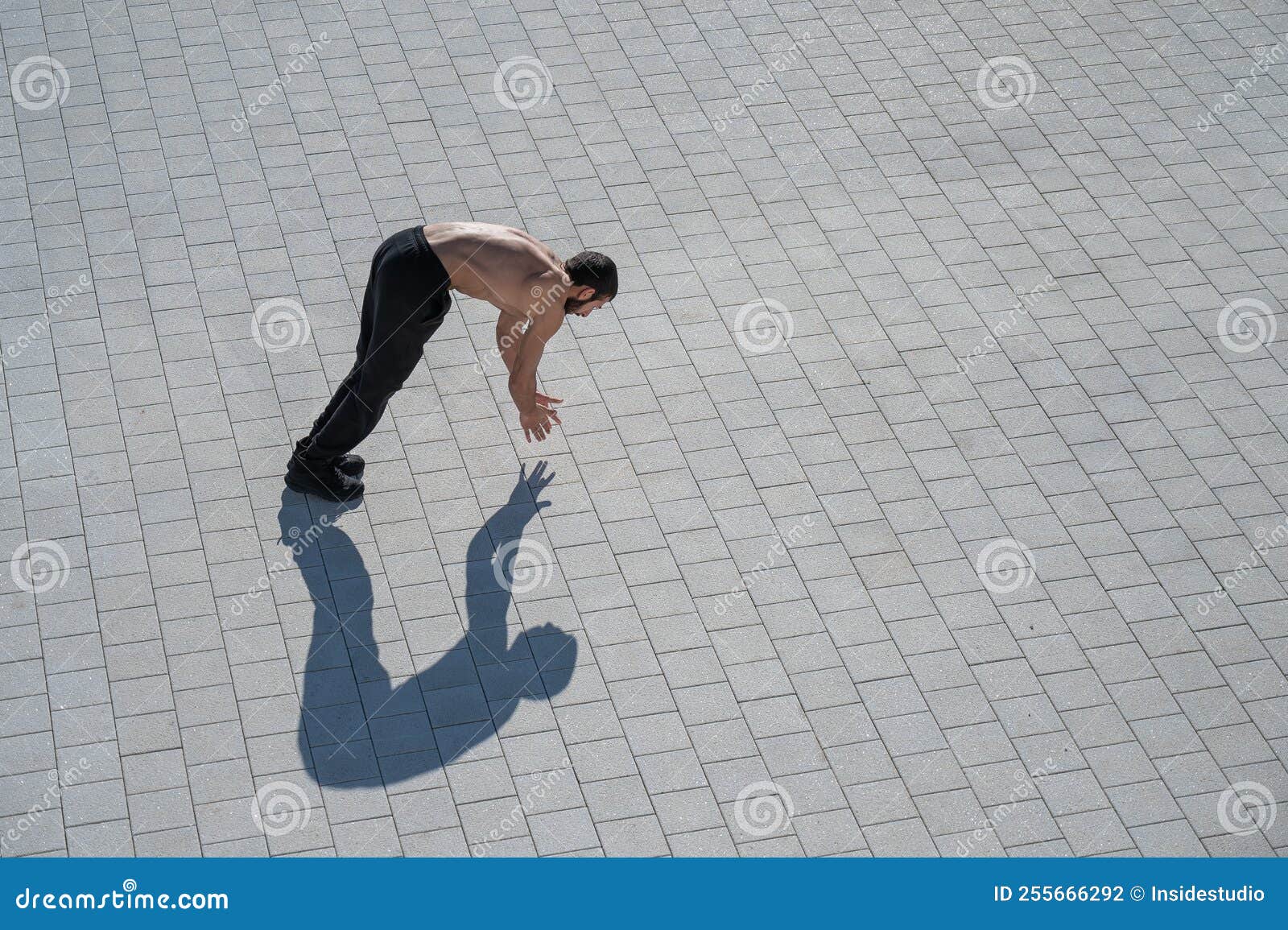 A Man Doing Push-ups with Flying Outdoors. Stock Photo - Image of ...