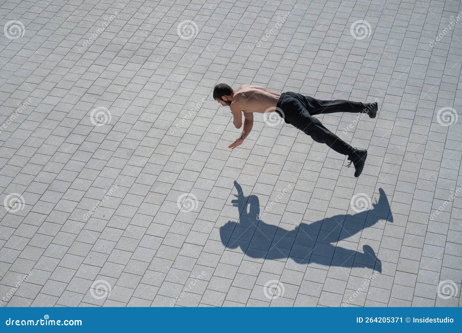 A Man Doing Push-ups with Flying Outdoors. Stock Image - Image of ...