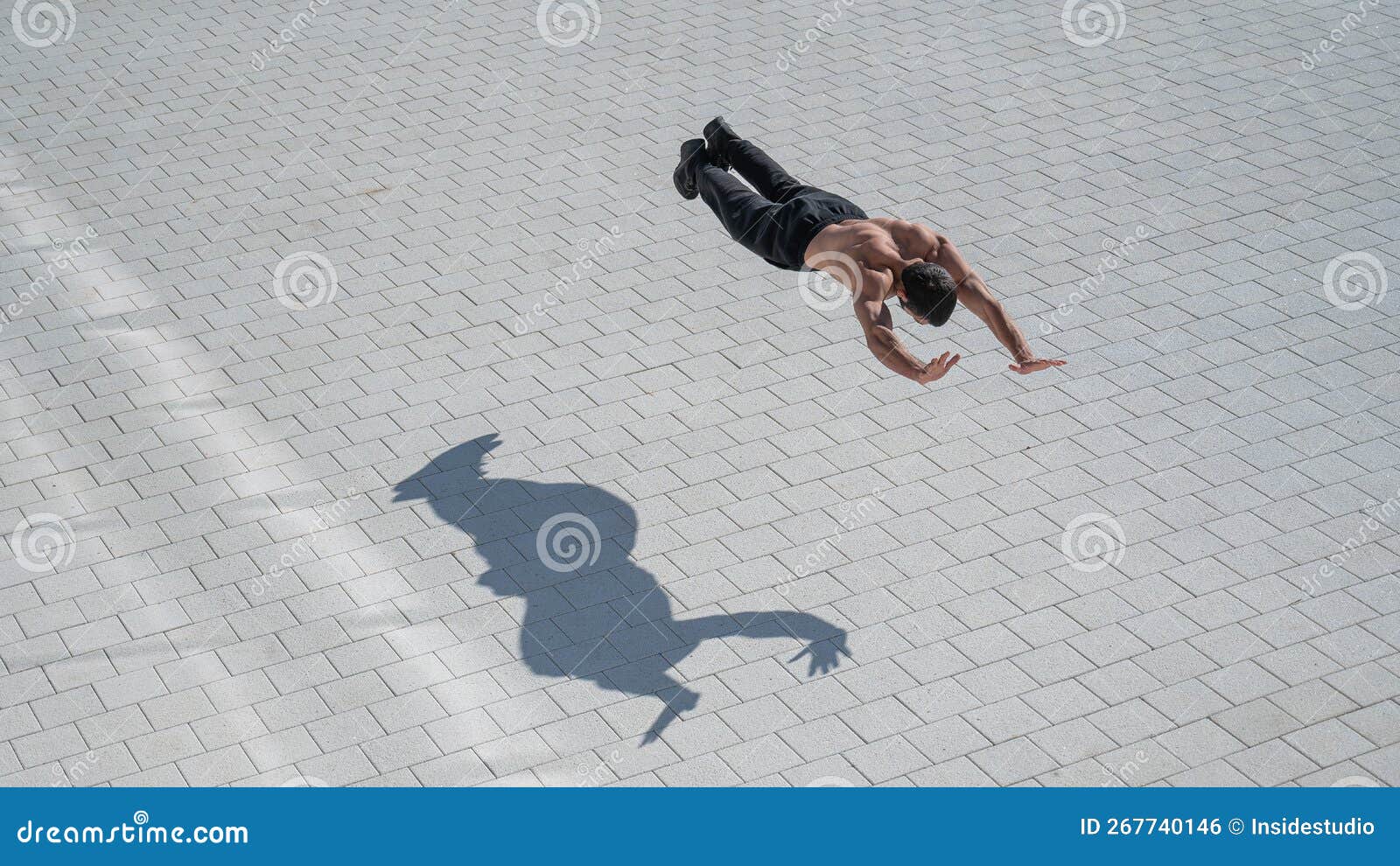 A Man Doing Push-ups with Flying Outdoors. Stock Photo - Image of ...