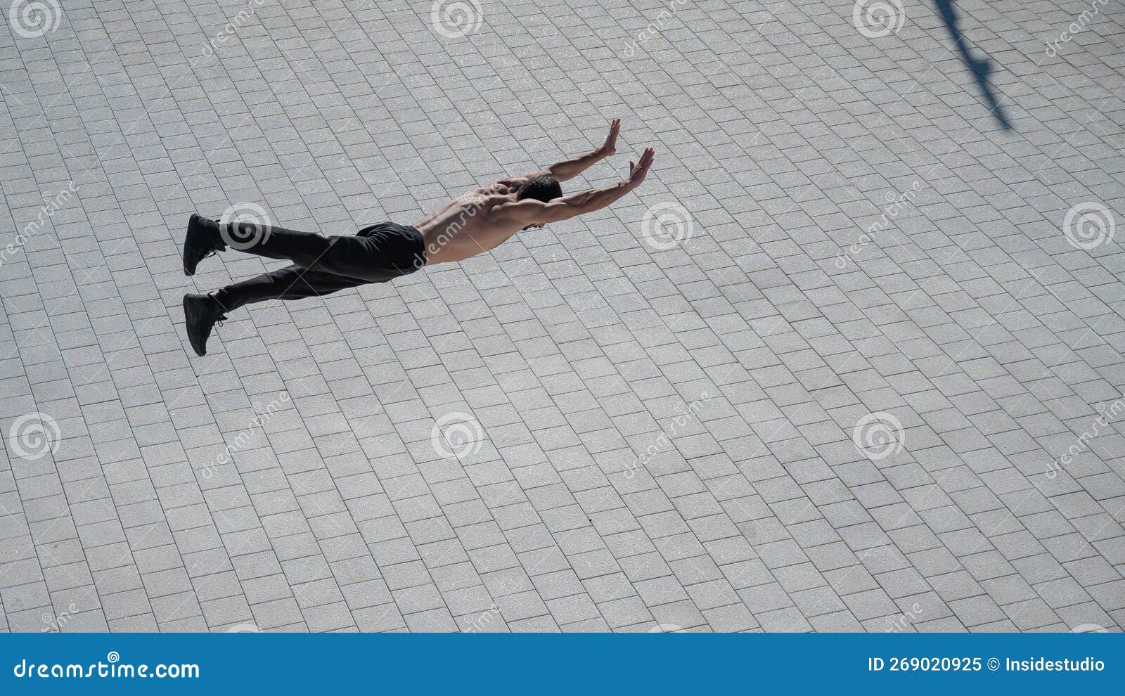 A Man Doing Push-ups with Flying Outdoors. Stock Image - Image of ...