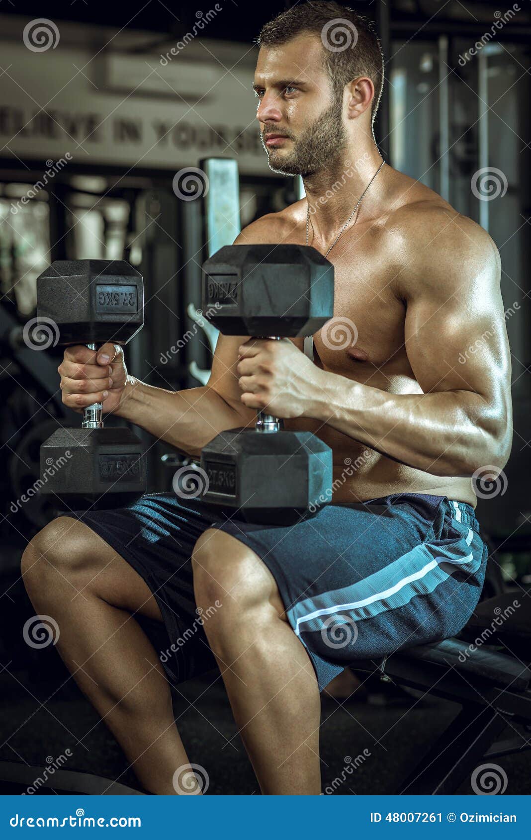 Man doing shoulder press stock image. Image of lifting - 48007261